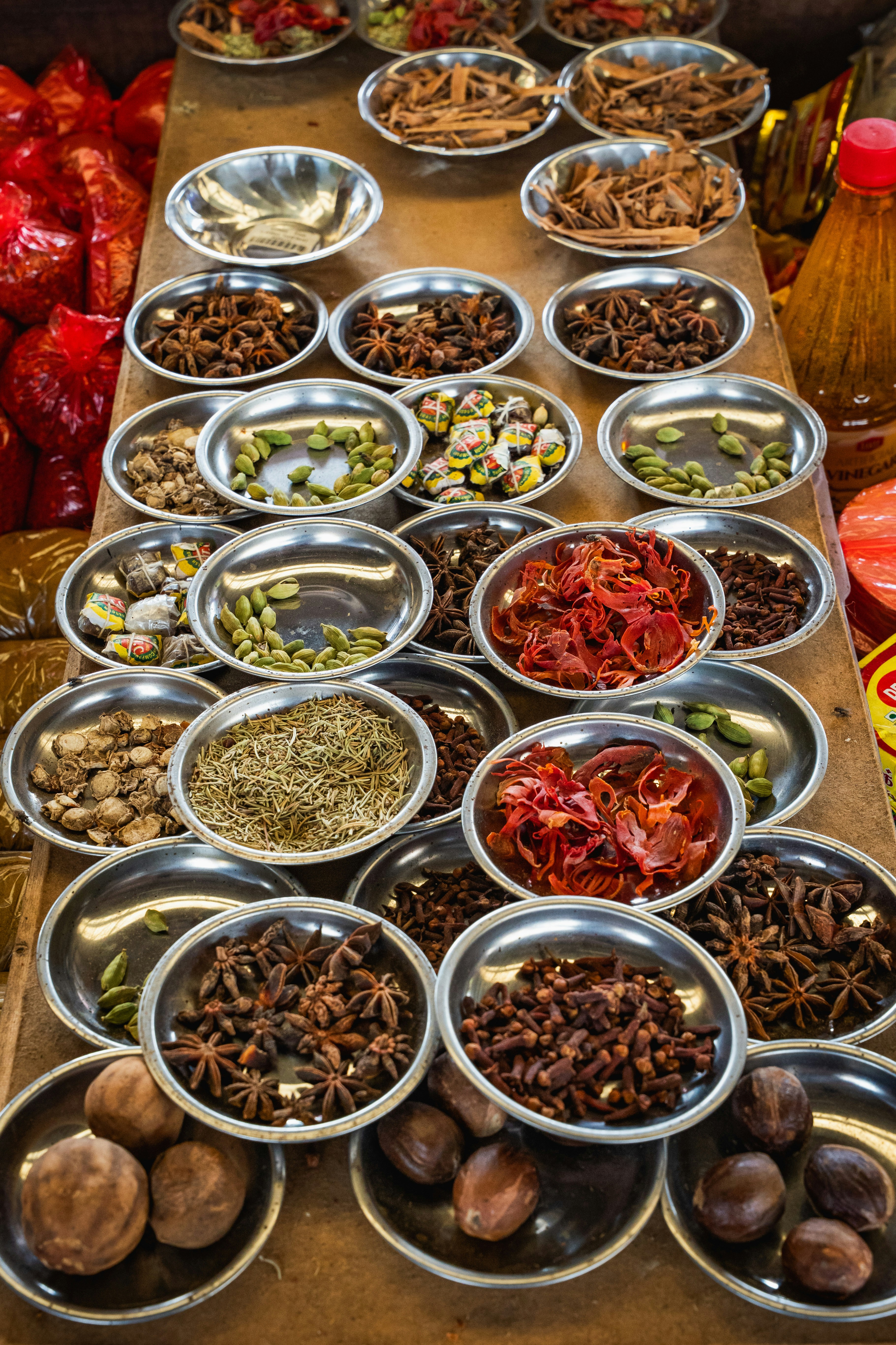 A Bustling Array of Spices and Dried Goods on a Market Stall