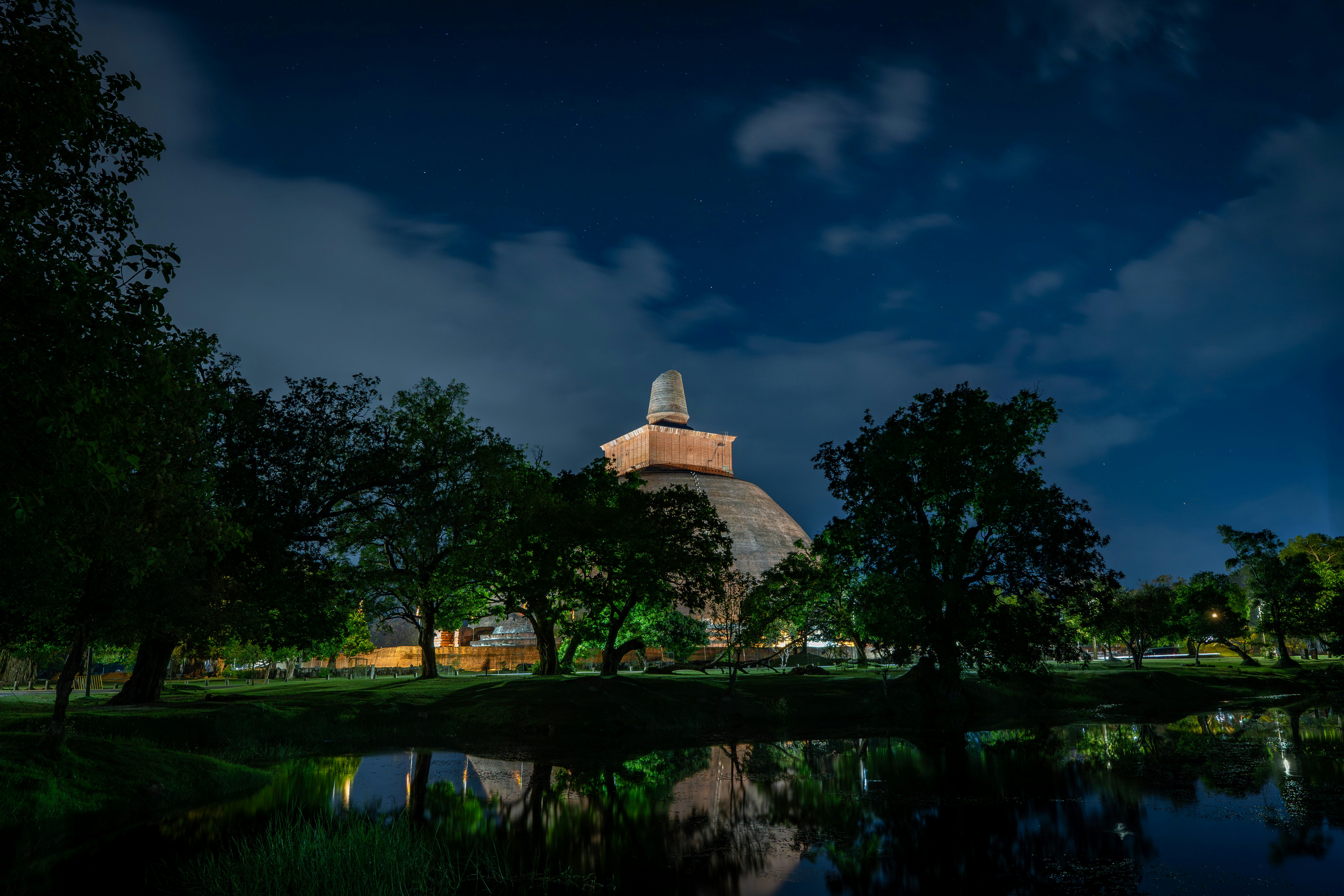 Moonlit Stupa Rising Over a Quiet Night Park