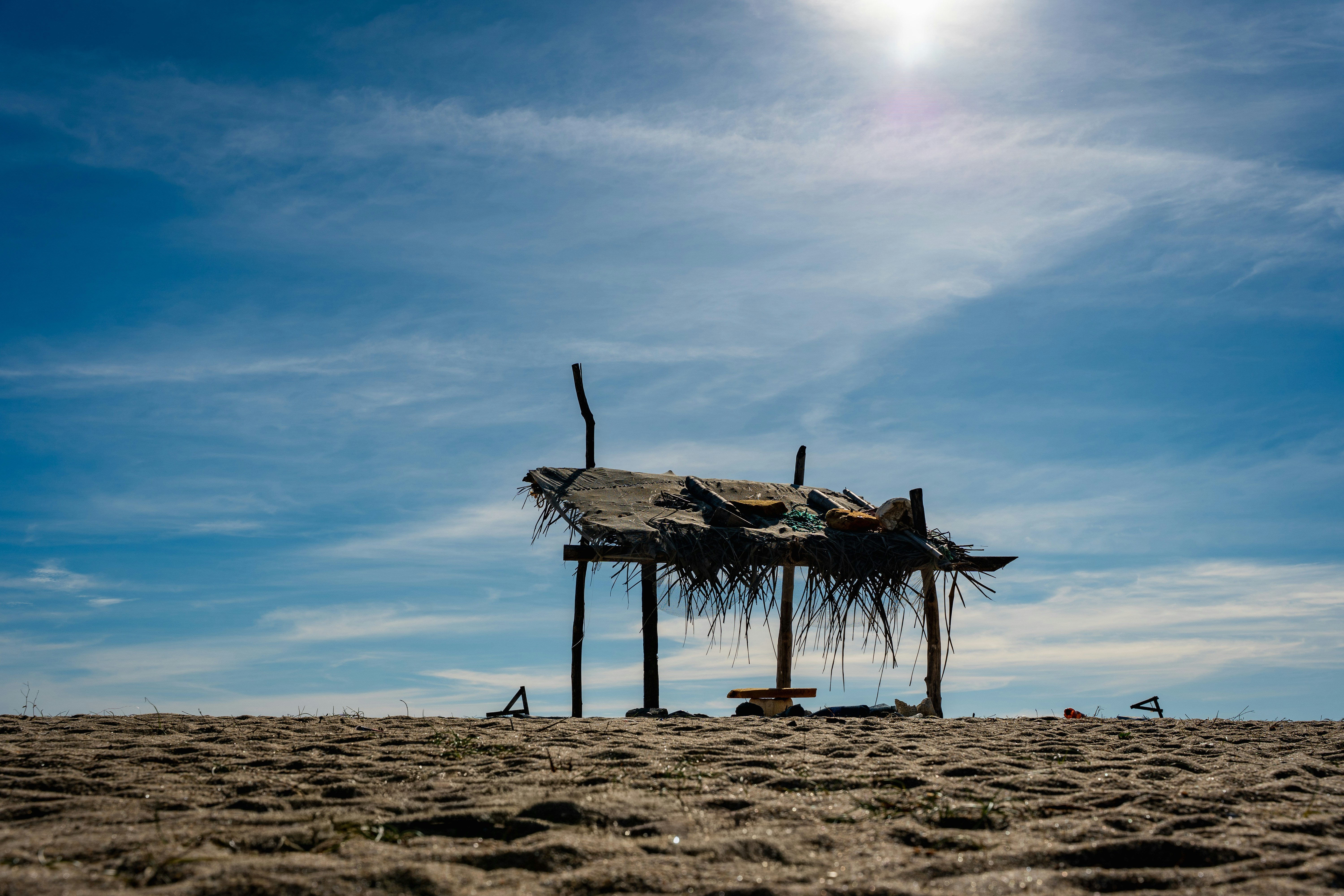 Isolated Shelter Beneath an Expansive Sky