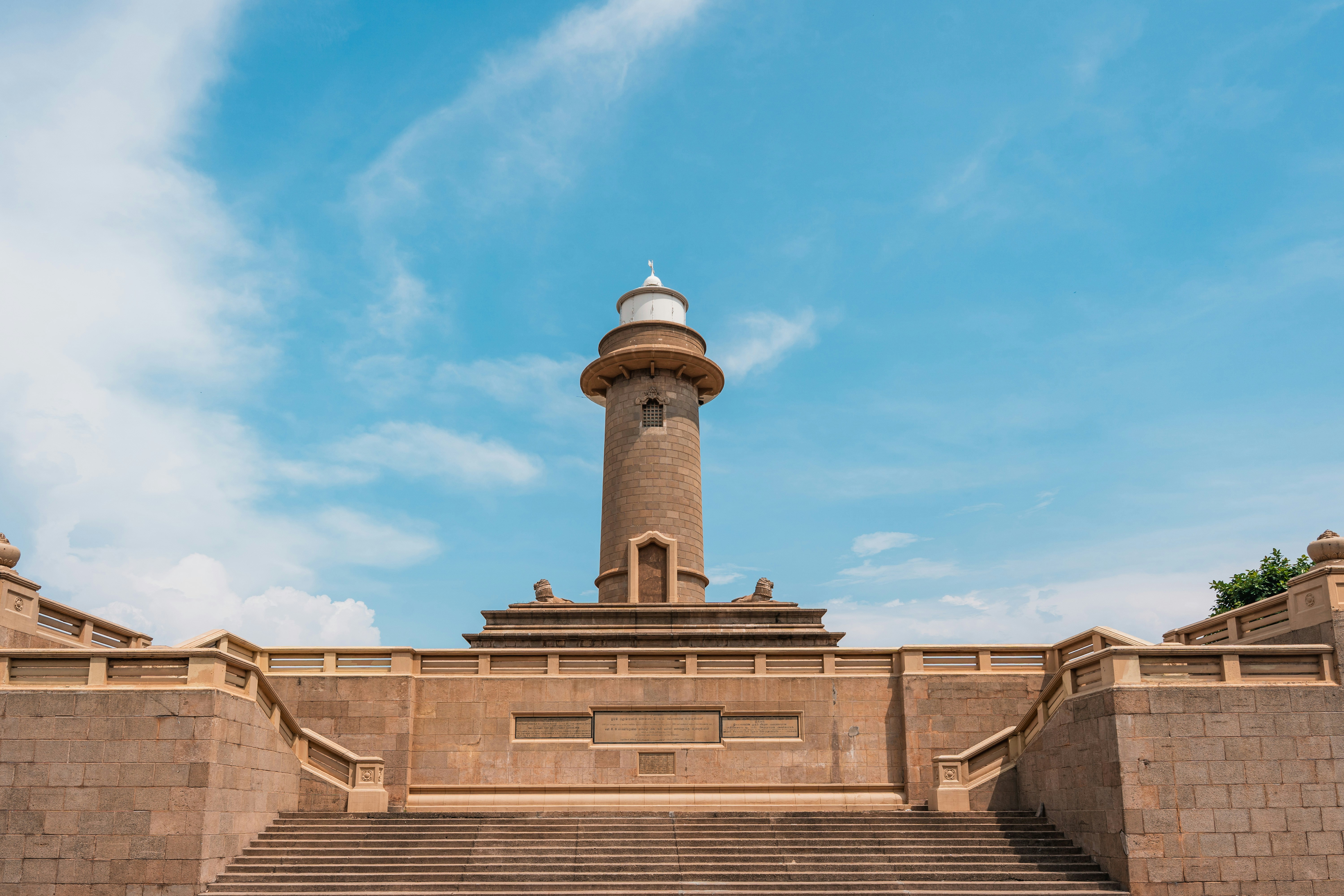 Steps to the Beacon: A Stone Tower Rising over Terraced Banks