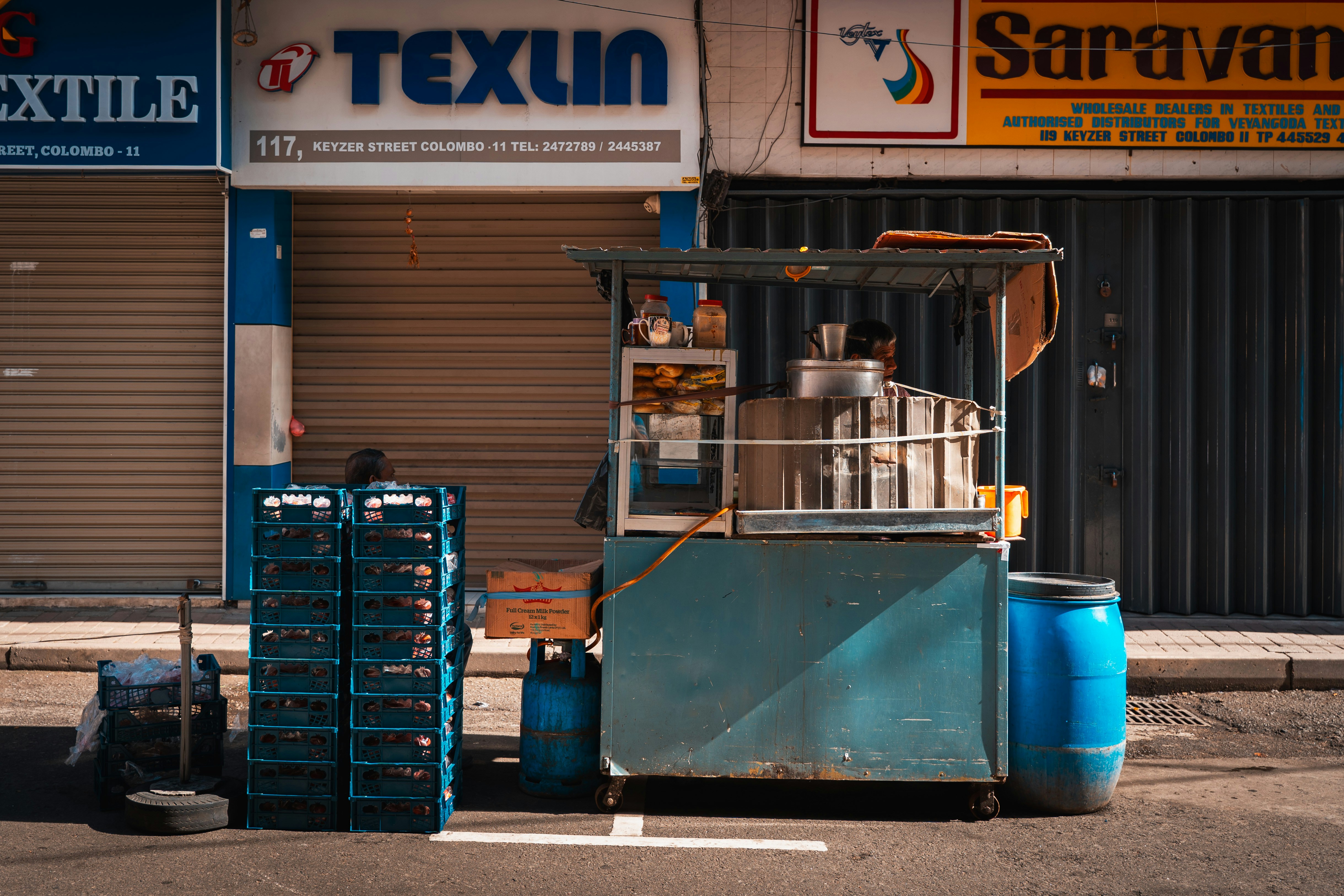 Stalled Market Cart Under a Blue awning