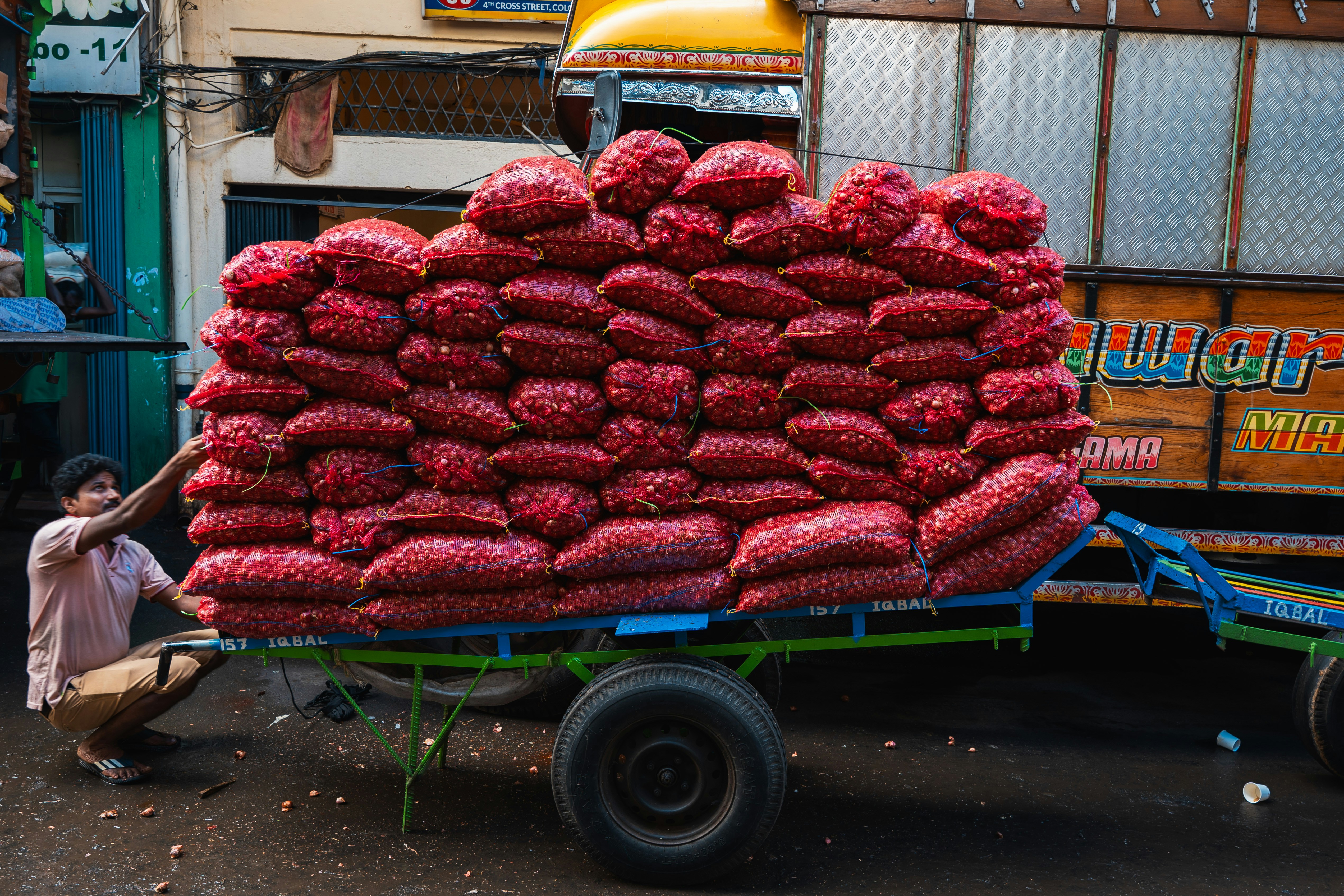 Stacked Red Onion Bales on a Street-Ready Truck
