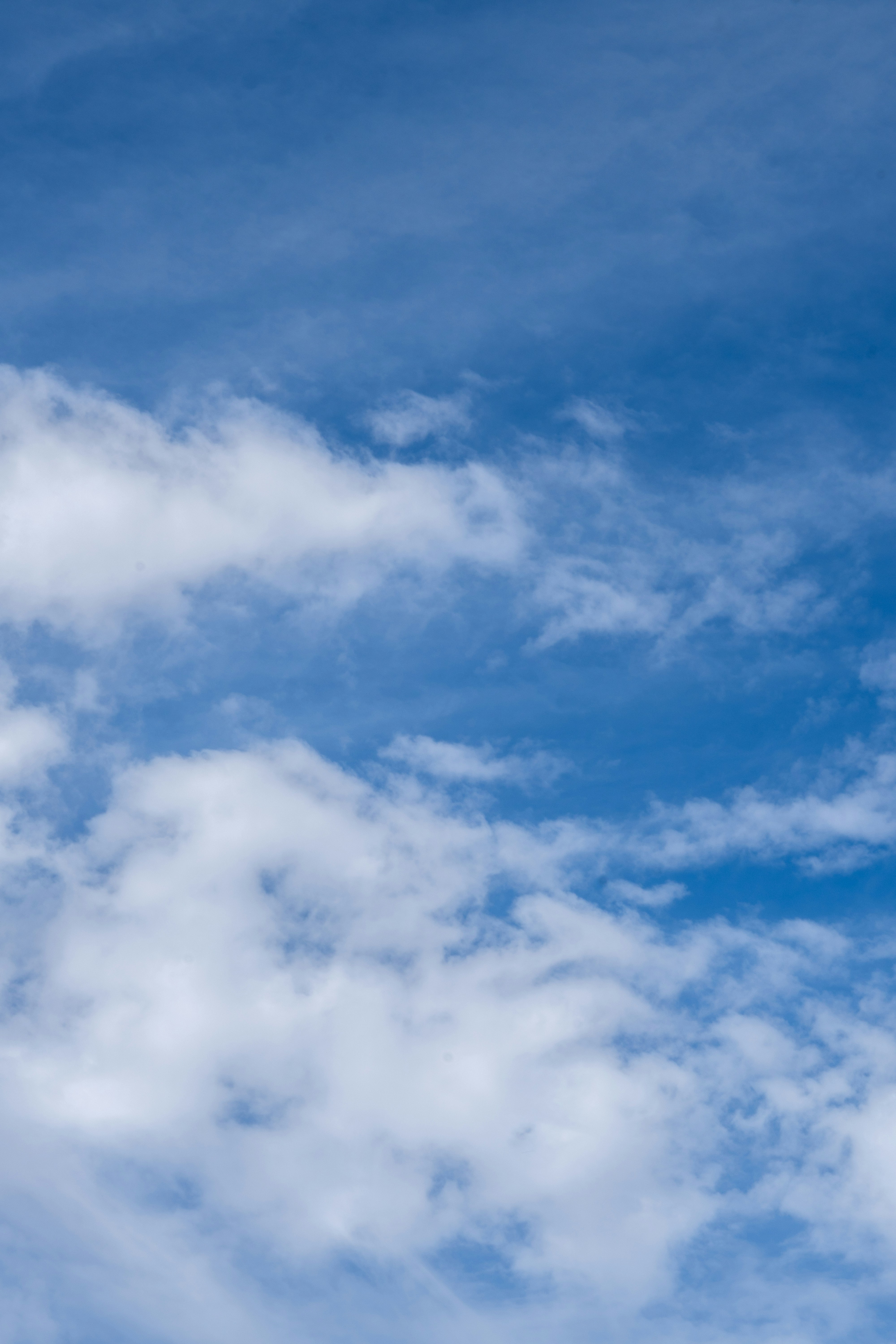 Azure Canvas: Open Sky with Gentle Wisps