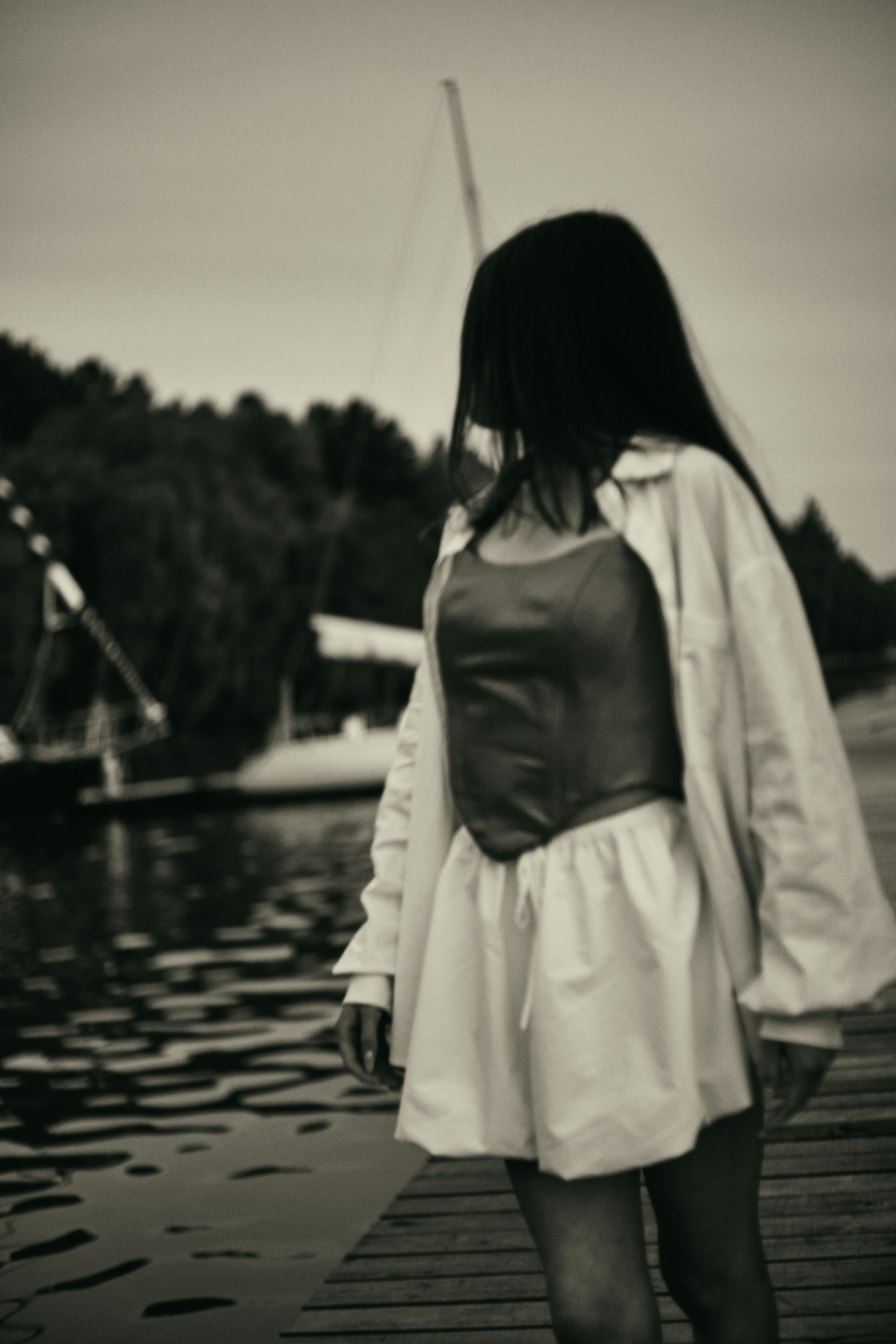 Silhouette by the Docks: Slipstream of a Quiet Evening