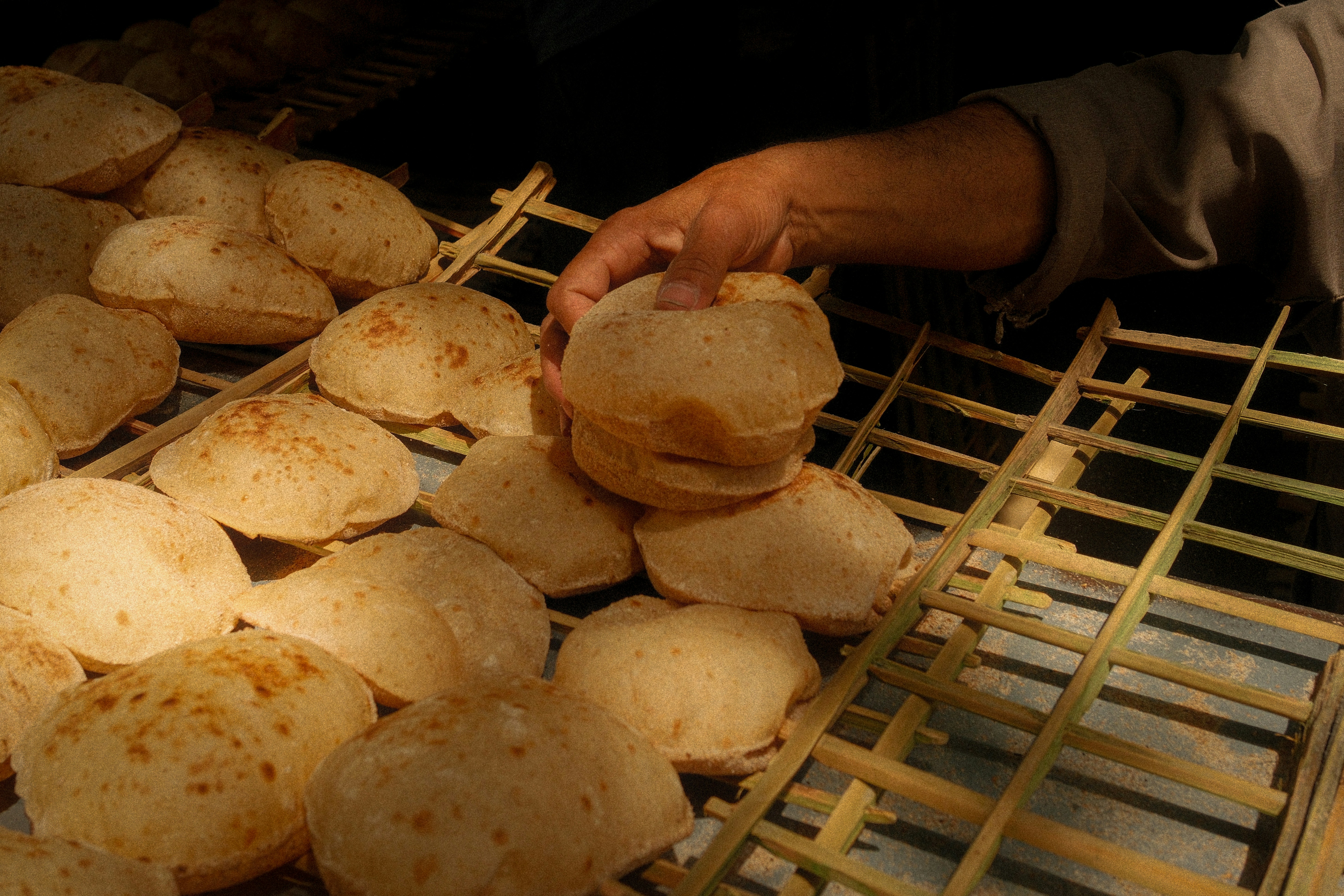 Hot Moments: Fresh Buns on a Wooden Rack