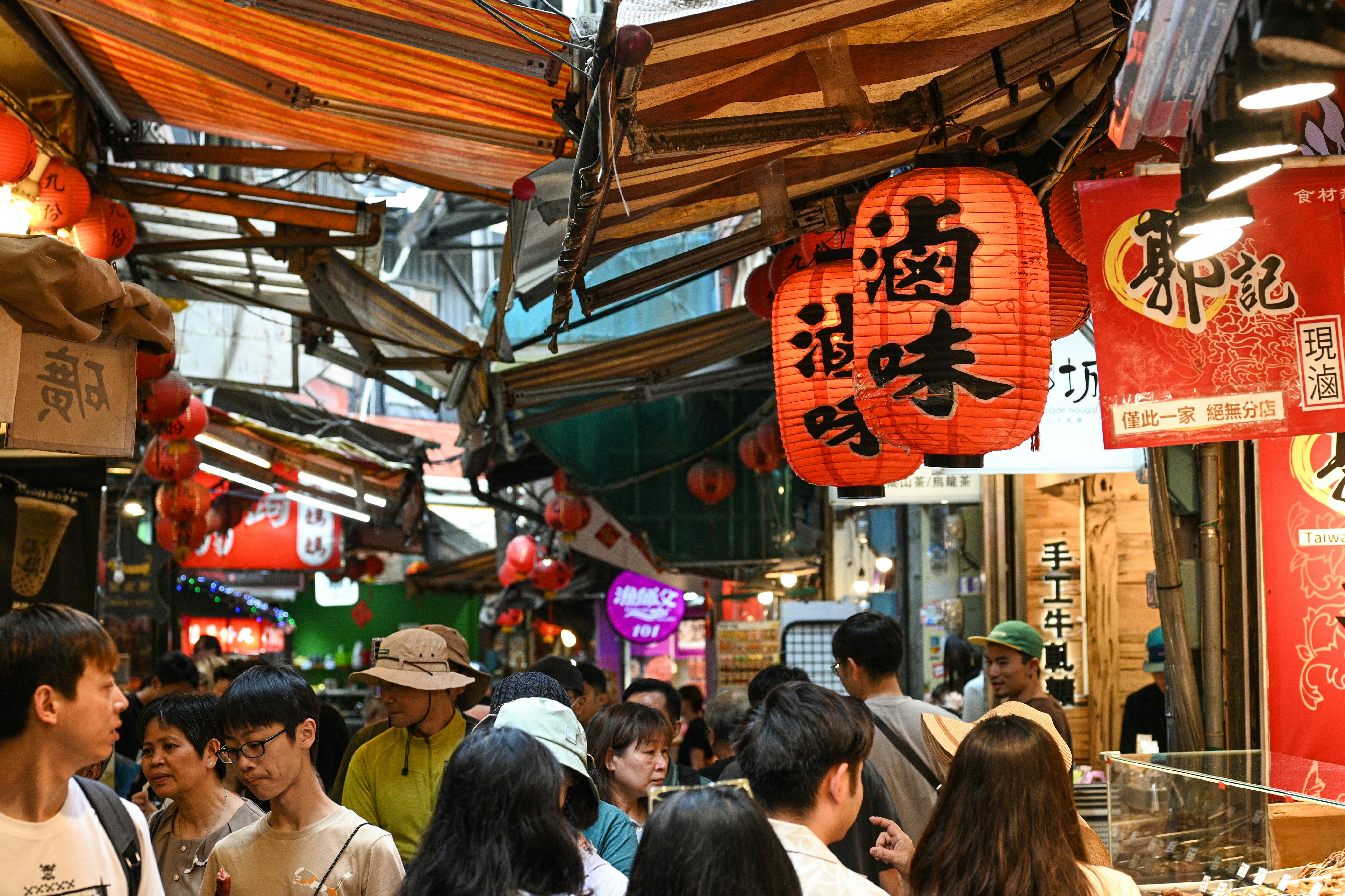 Lantern-lit Alleyway: A Burst of City Life Between Stalls