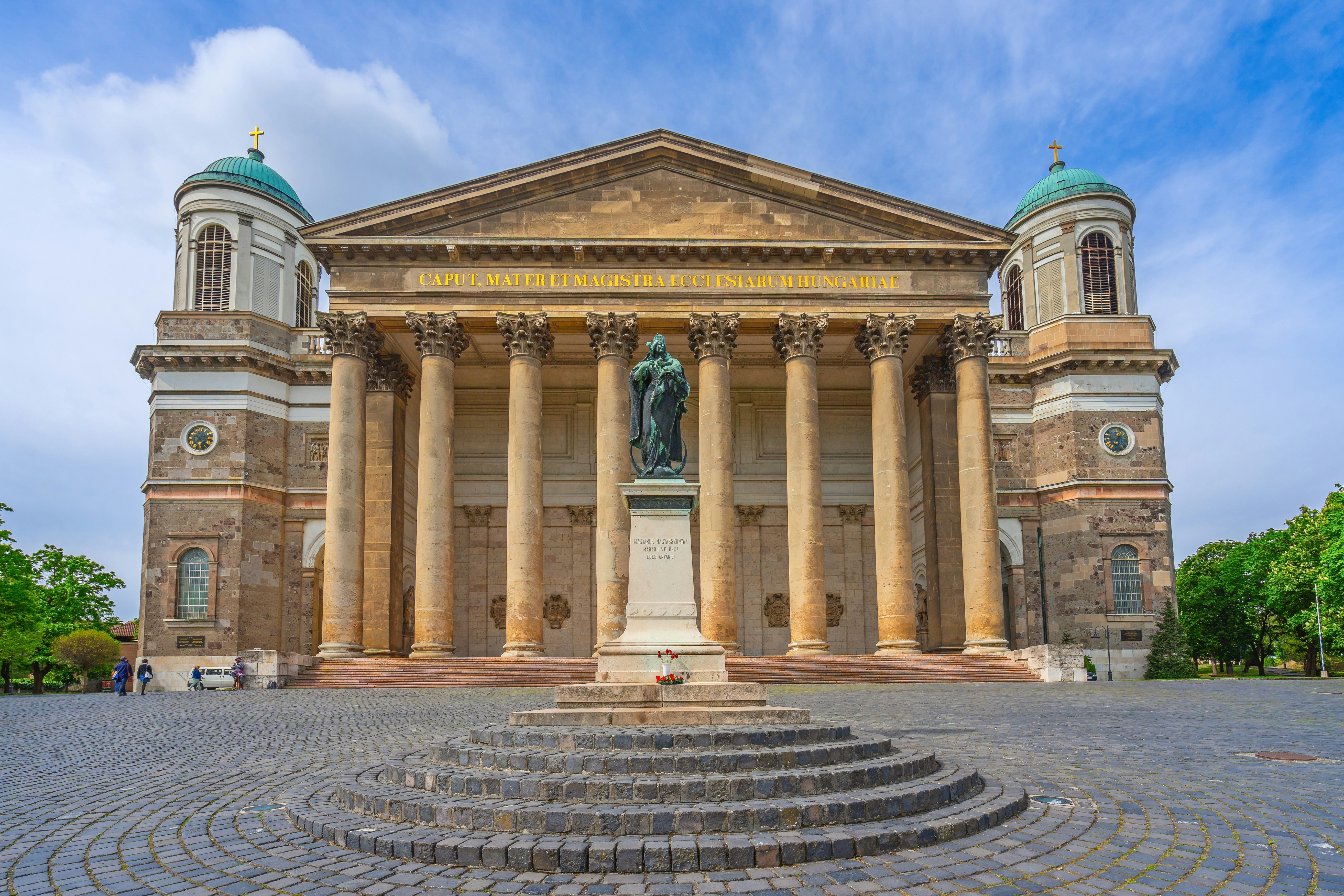 Statue in Front of a Classical Temple: A Grand Neoclassical Facade