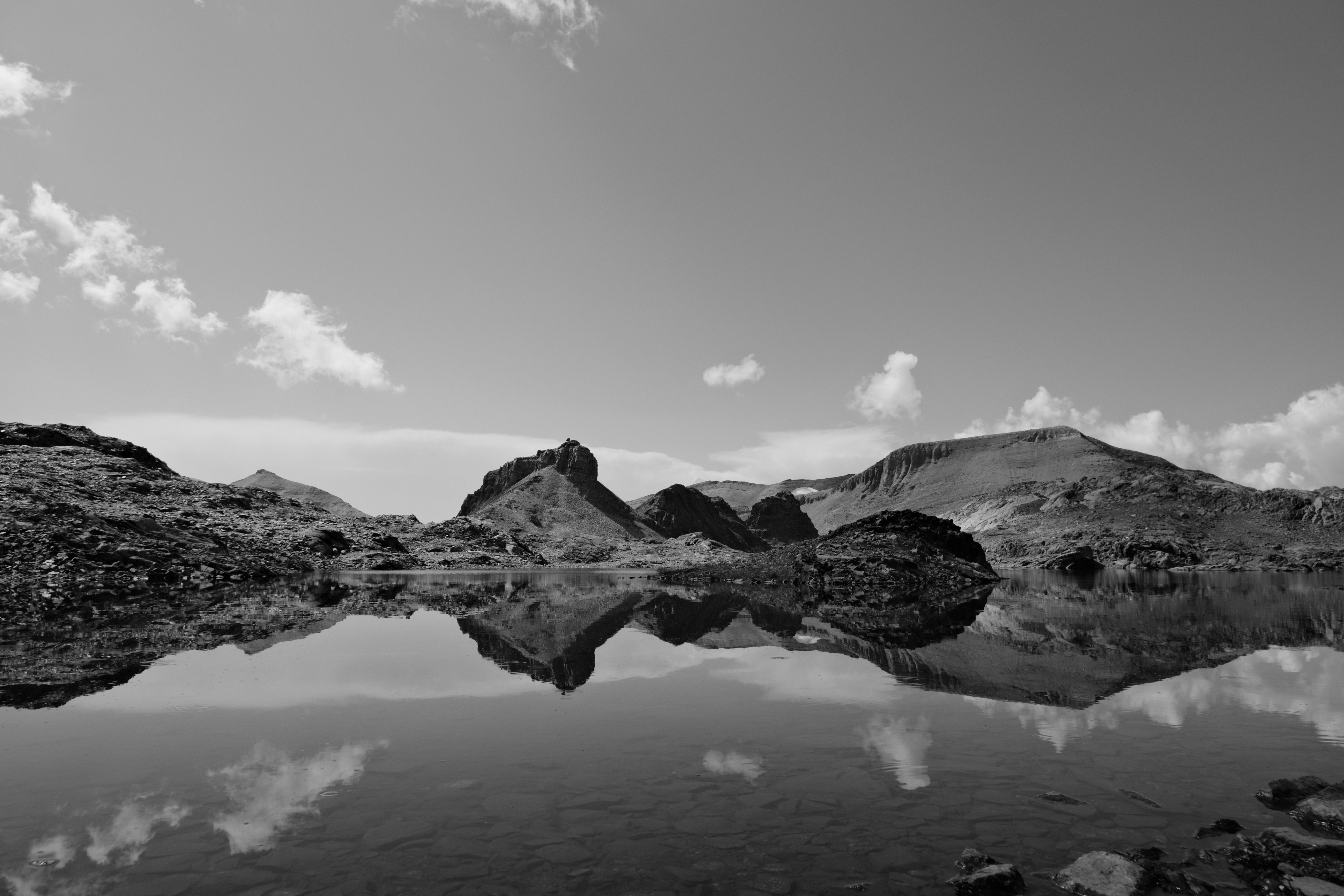 Mirror Ridge: Still Waters Reflect a Distant Peak