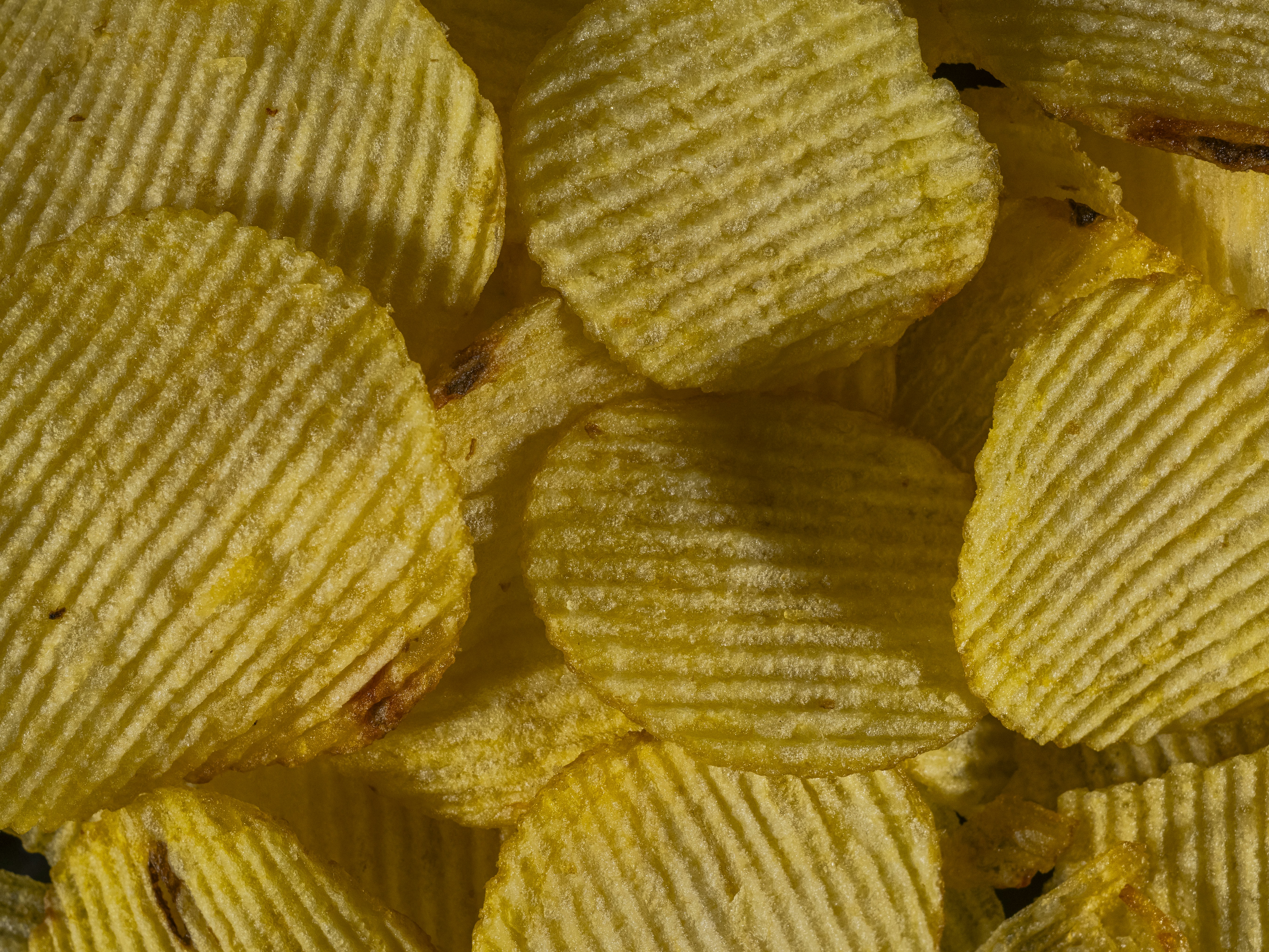Crisp Golden Ripples: Potato Chips in a Sunlit Crunch