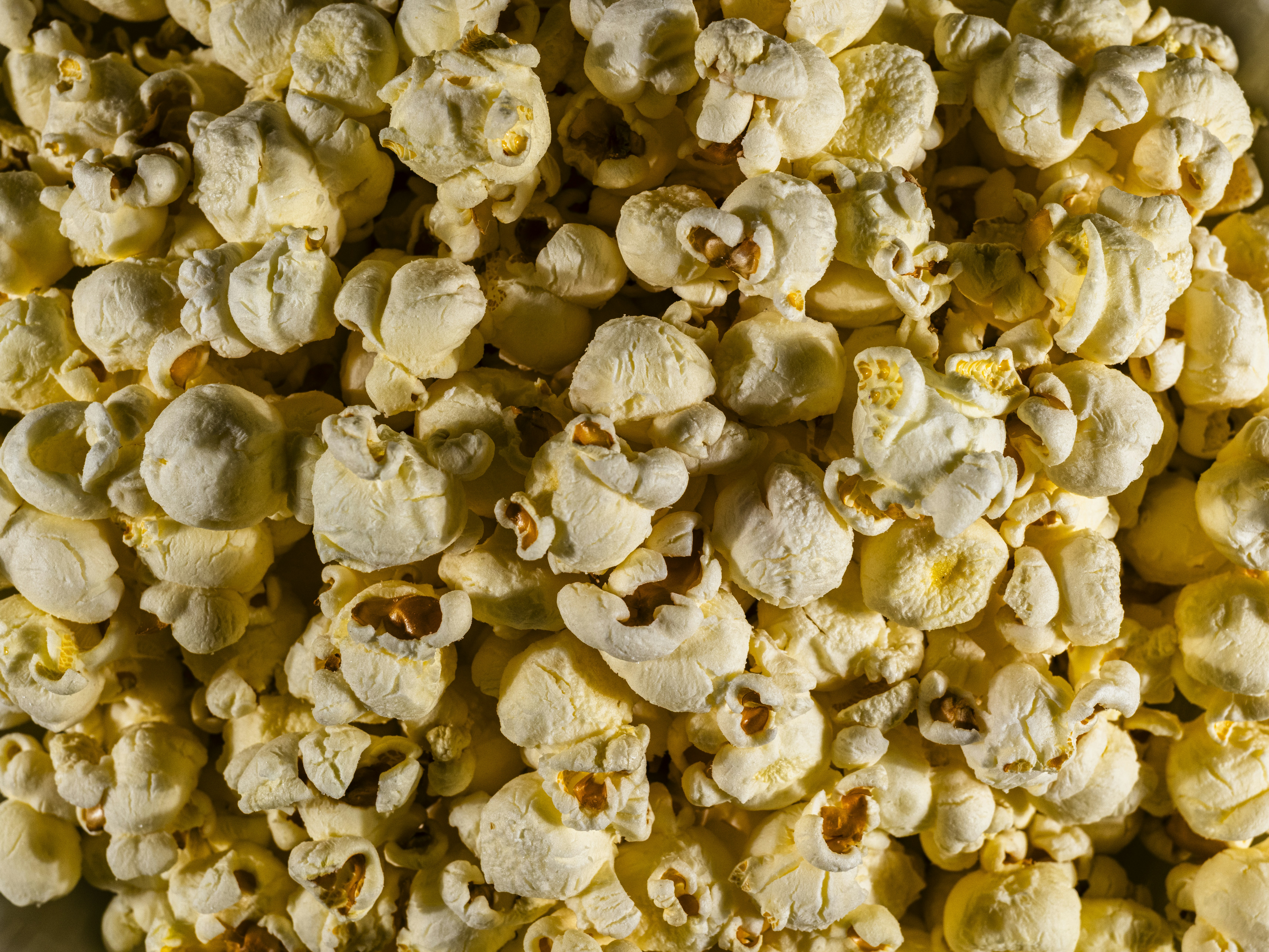 Golden Popcorn Spotlight: A Close-Up of Puffed Perfection