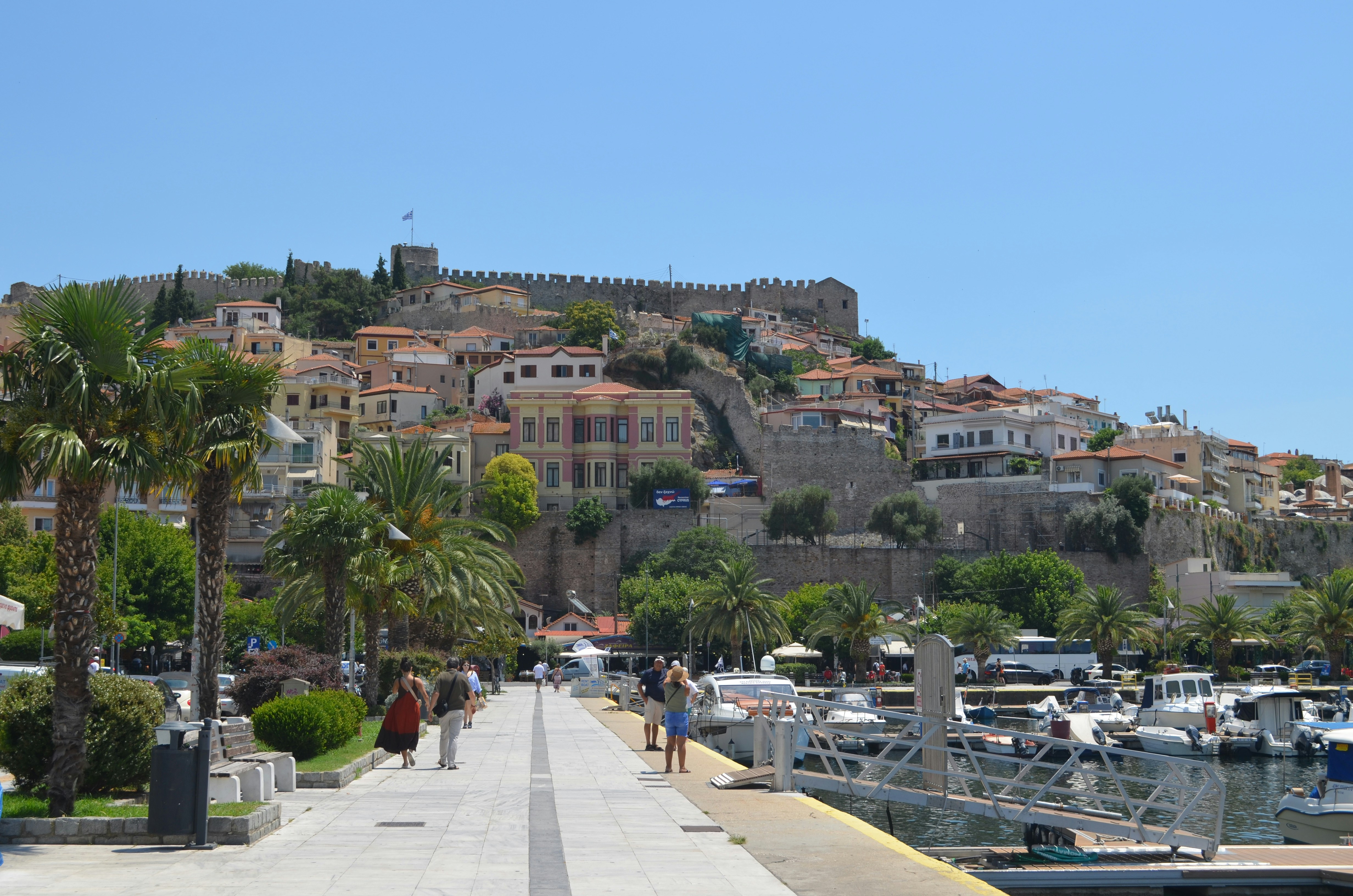 Harbor Promenade Beneath a Historic Citadel