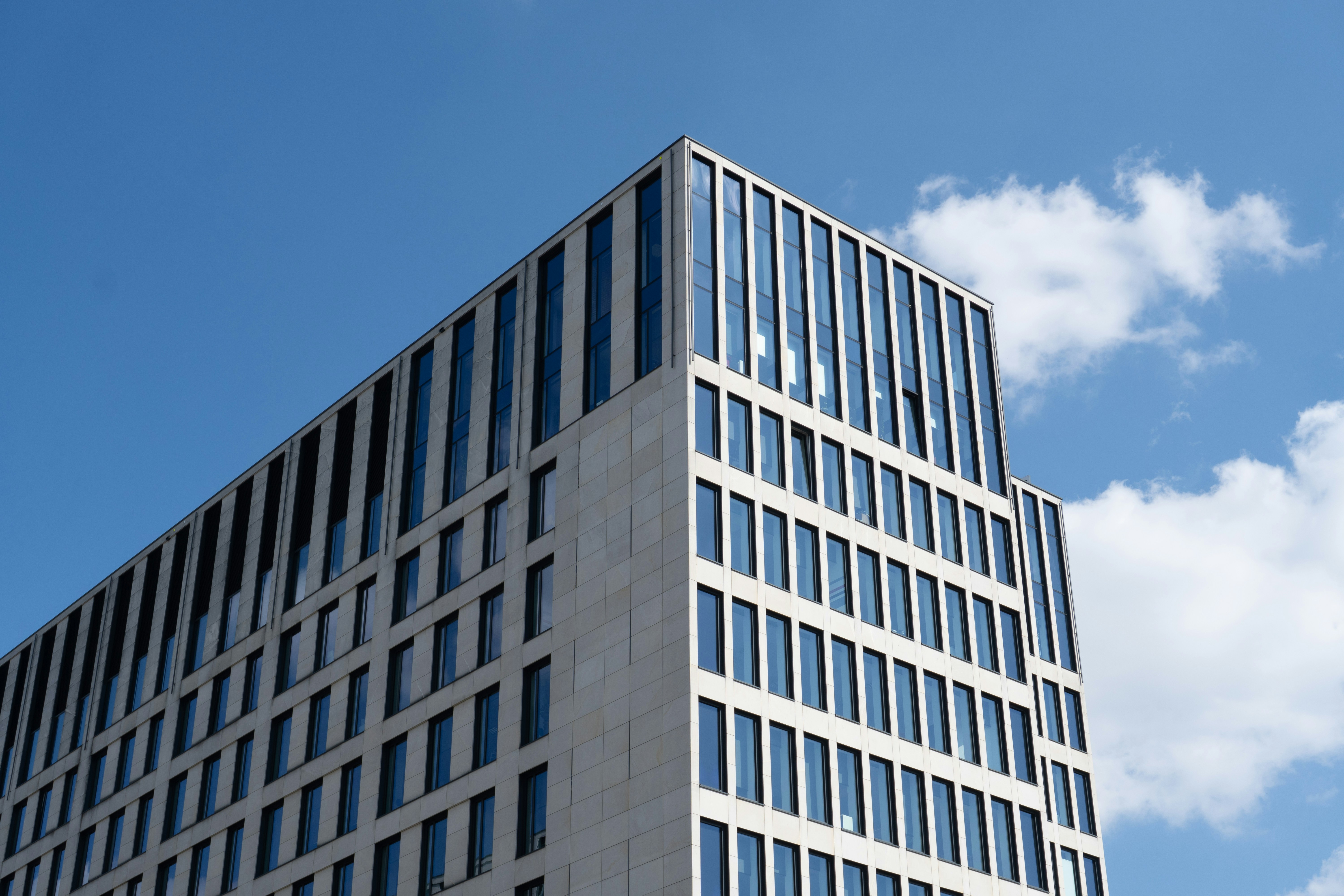 Cornered Zenith: A Sharp View Up the Modern Facade