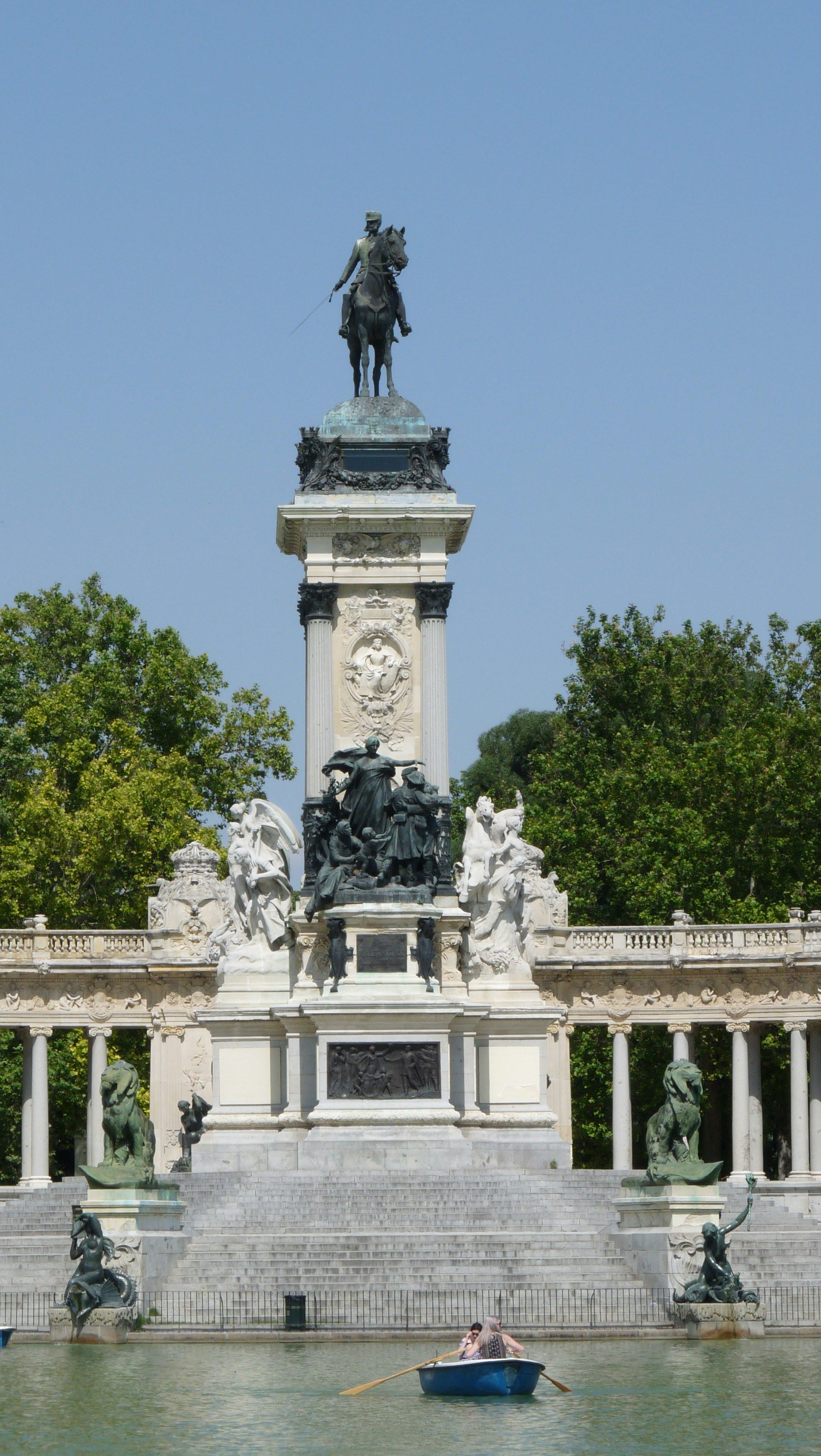 Equestrian Monument Rising Over Steps, Two Rowers Crossing the Lake