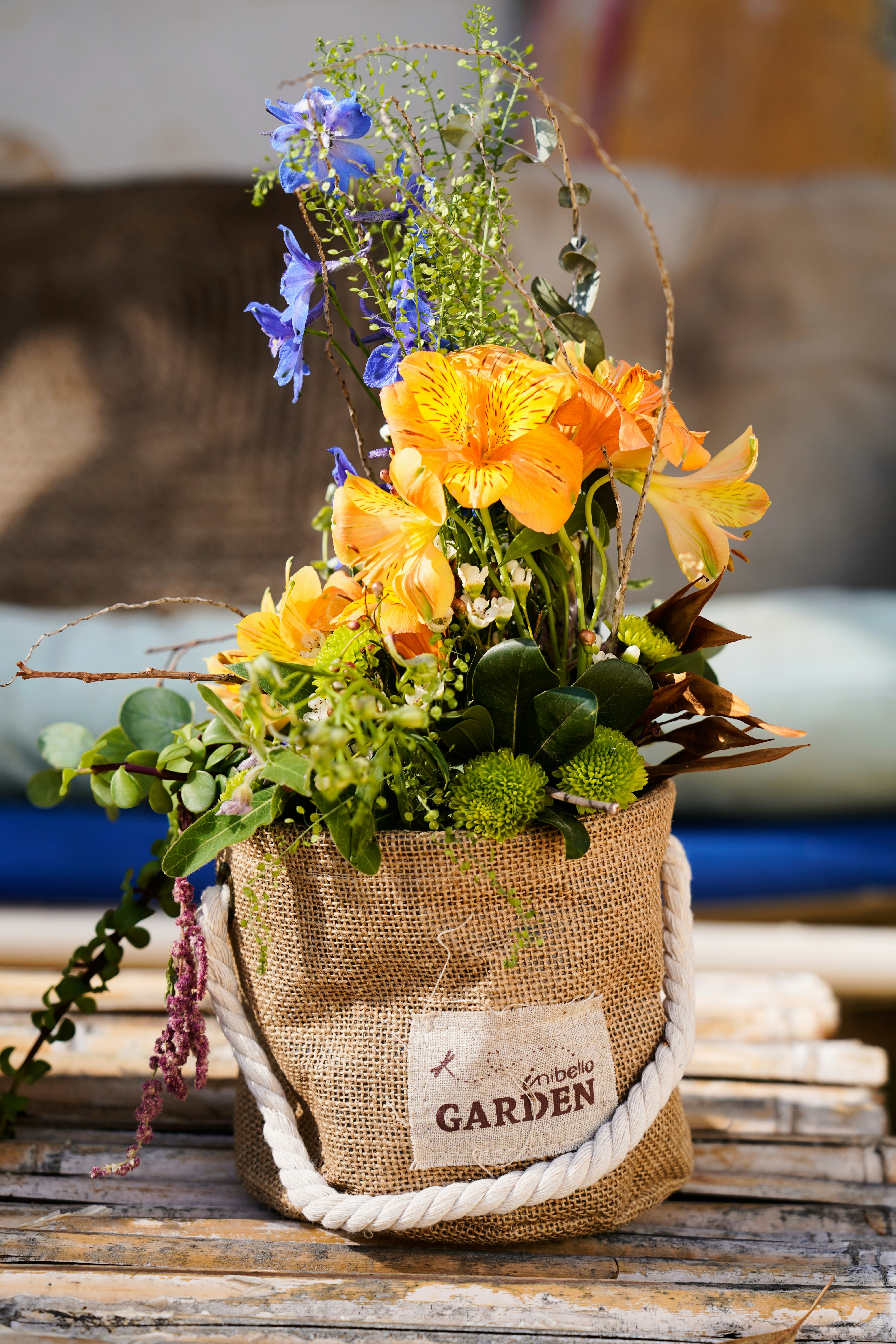 Sunlit Bouquets in a Burlap Vessel