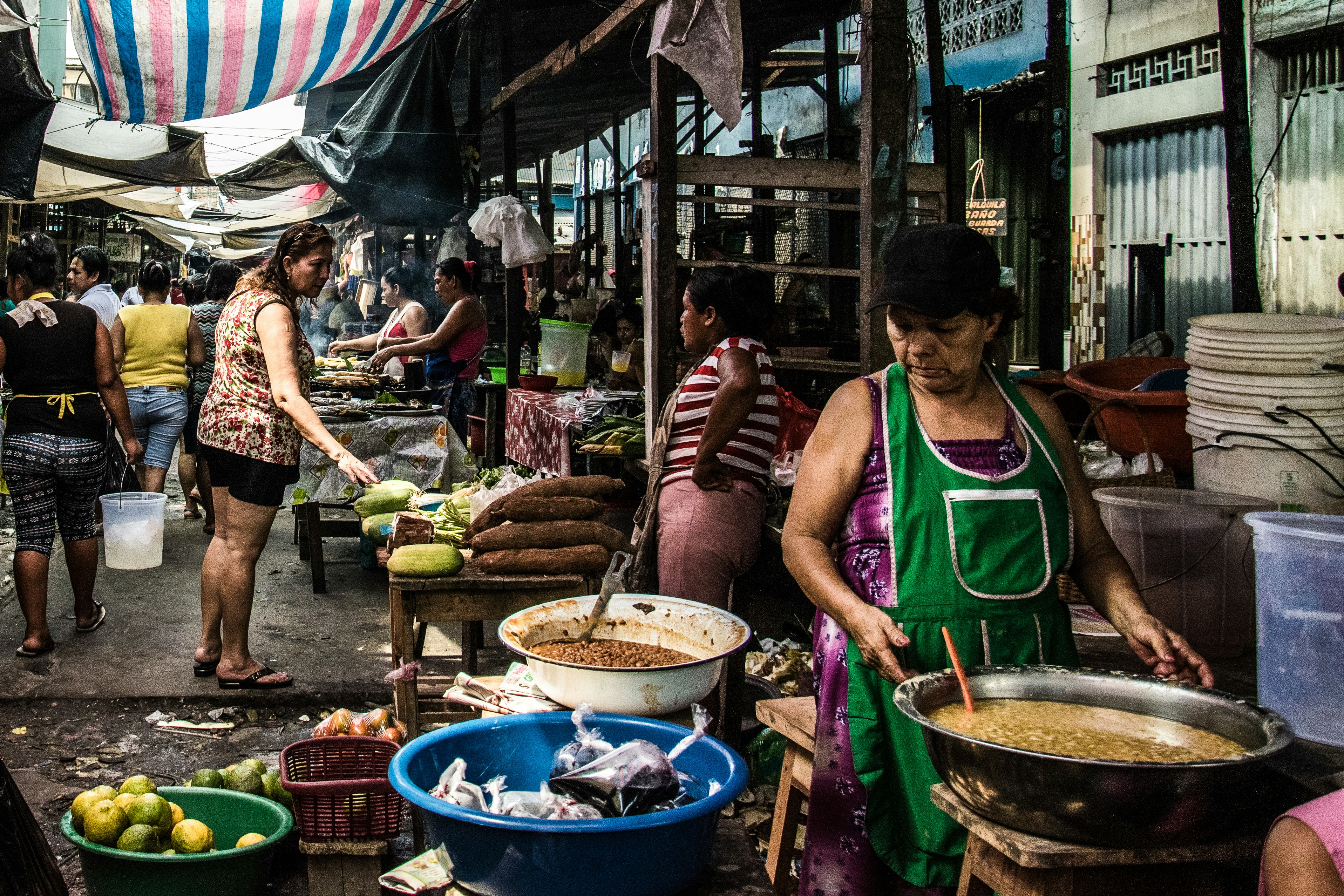 Steam and Spices at a Bustling Street Market