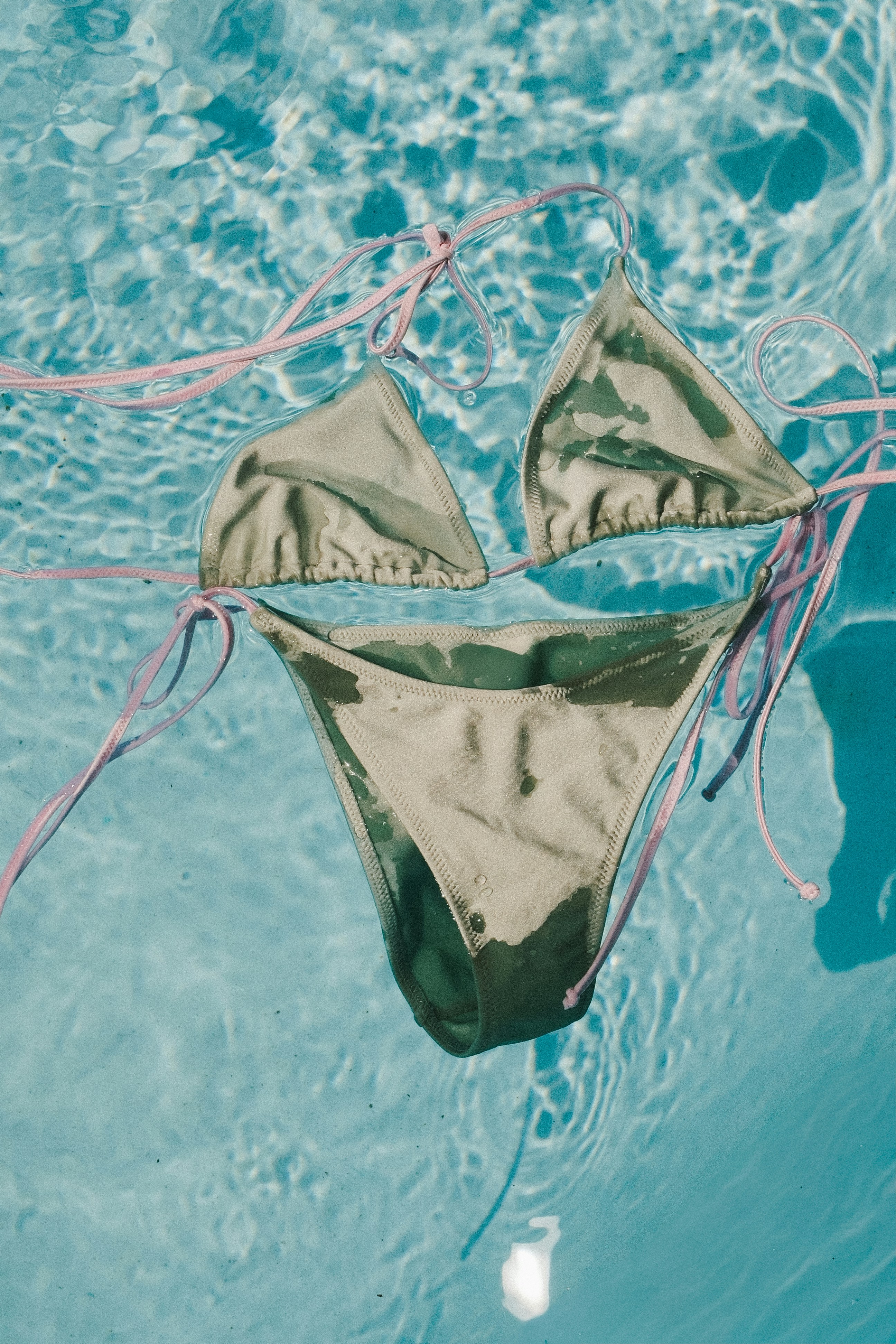Pastel Swimwear Drifts on Teal Oasis