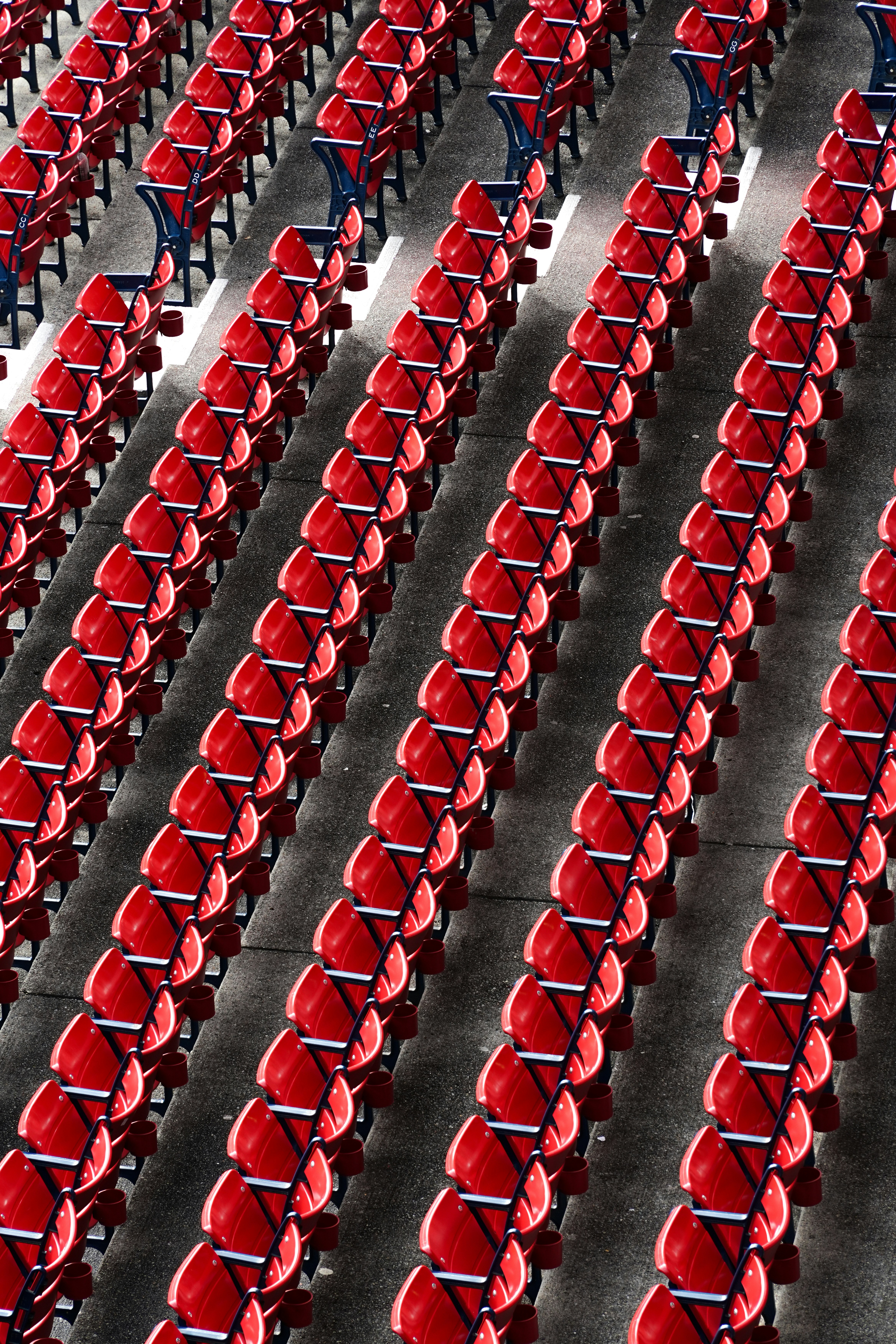Red Stadium Rows: Aerial Symphony of Seats