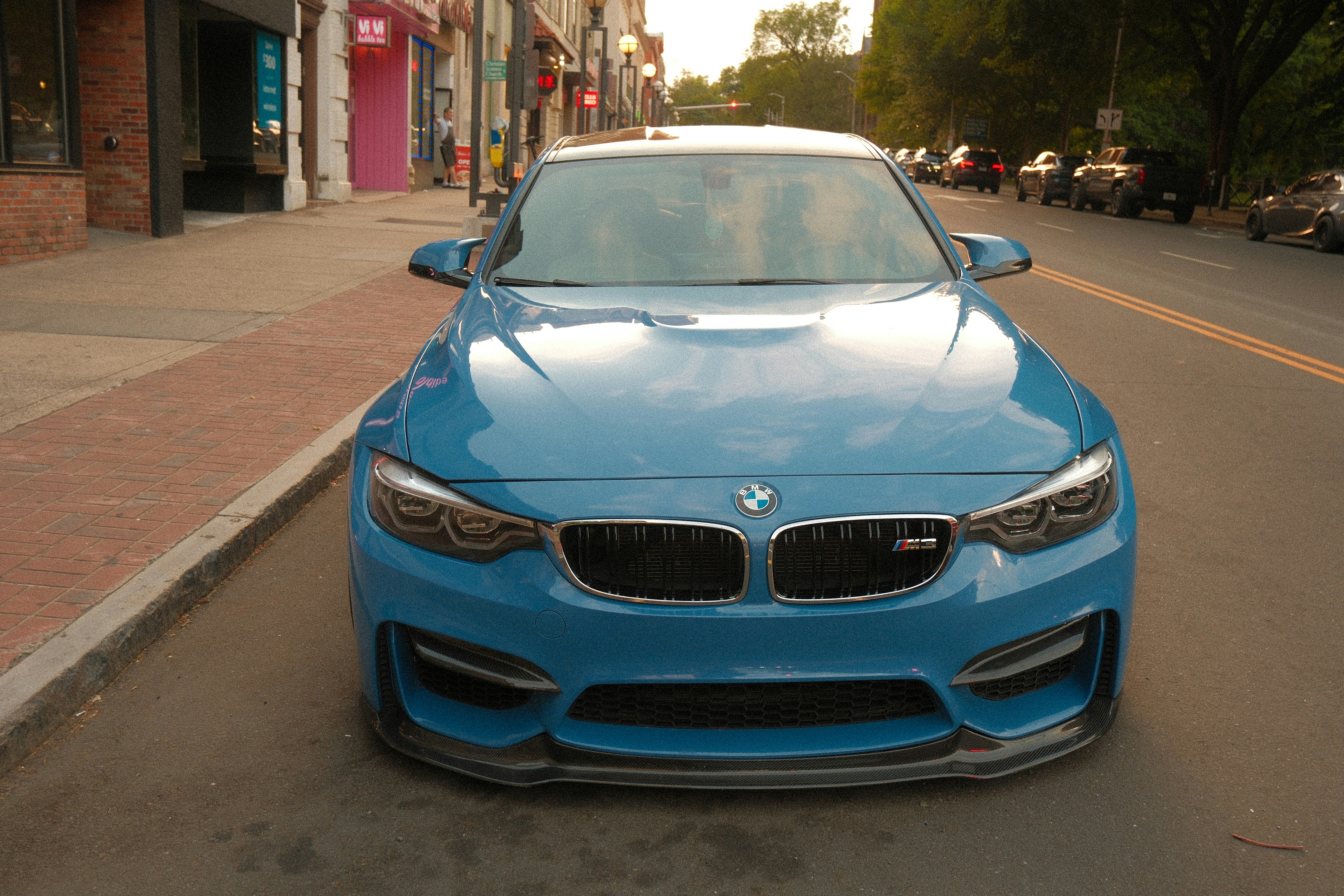 Blue BMW Front-and-Carity: Street-Spot Car Ready for Takeoff