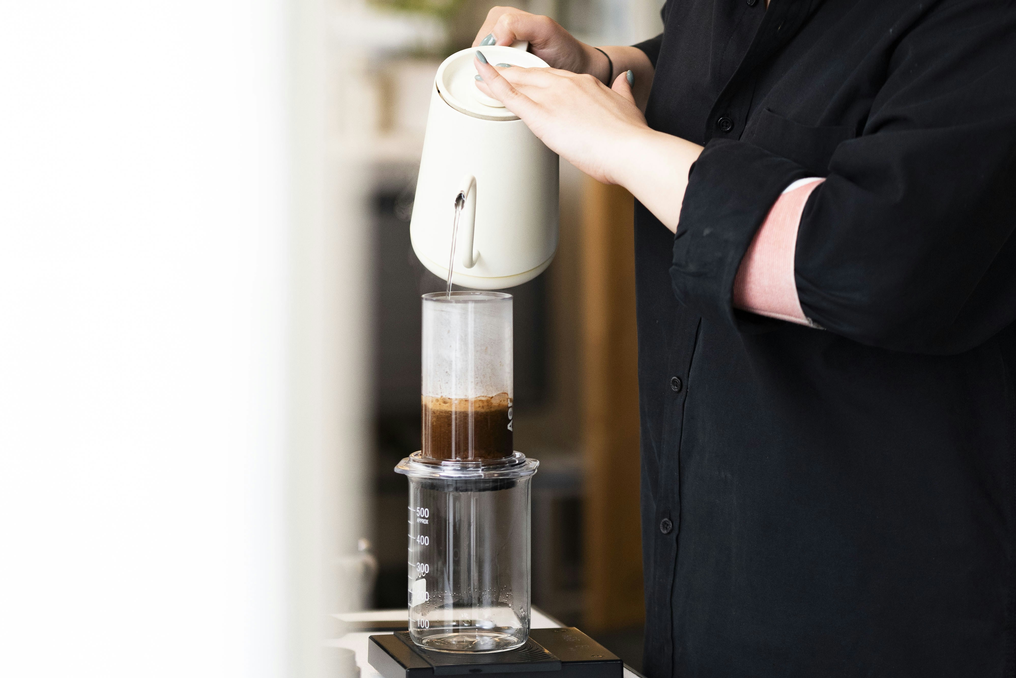 Precision Pour: A Barista Creates a Layered Coffee Infusion