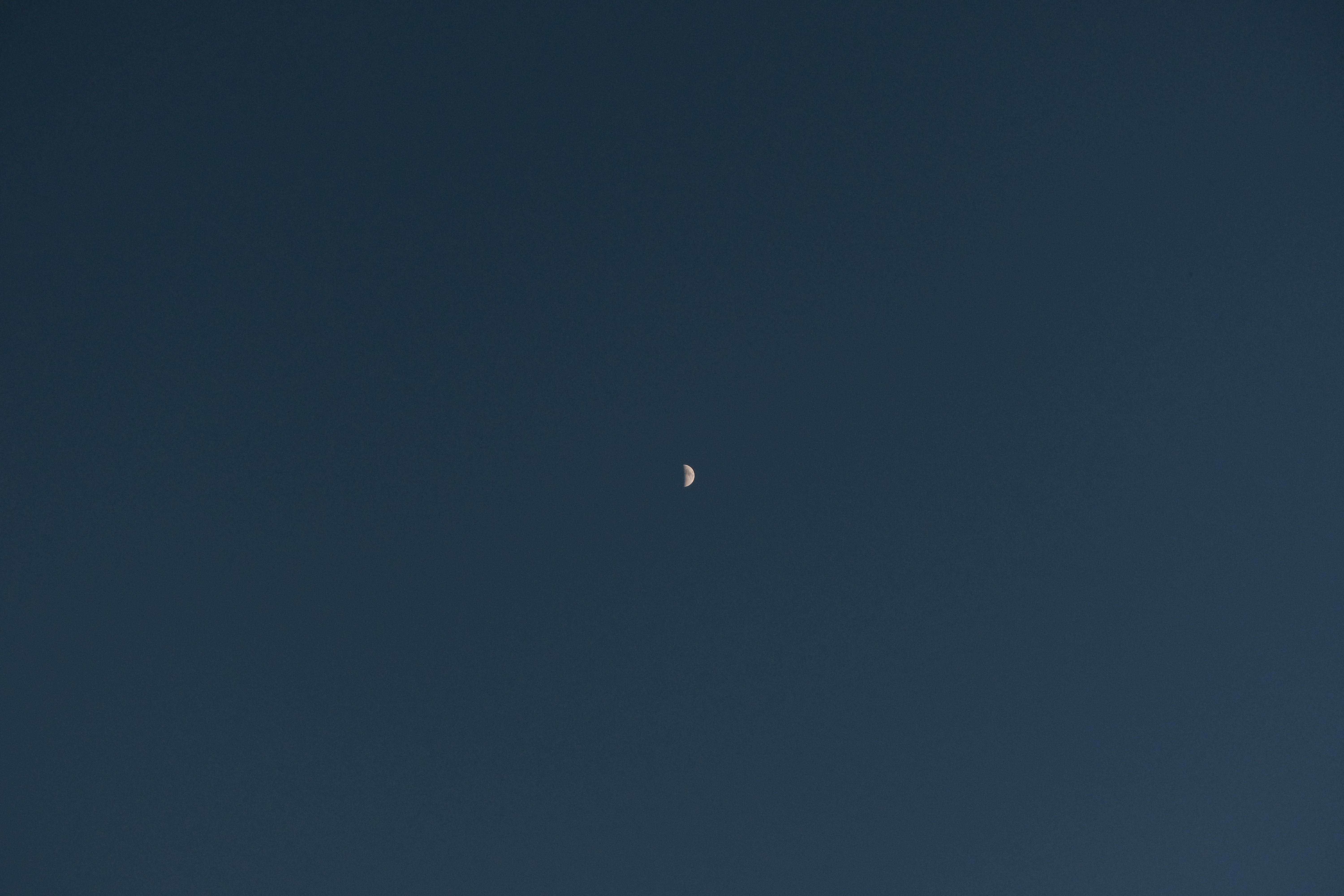 Crescent in a Quiet Twilight Sky