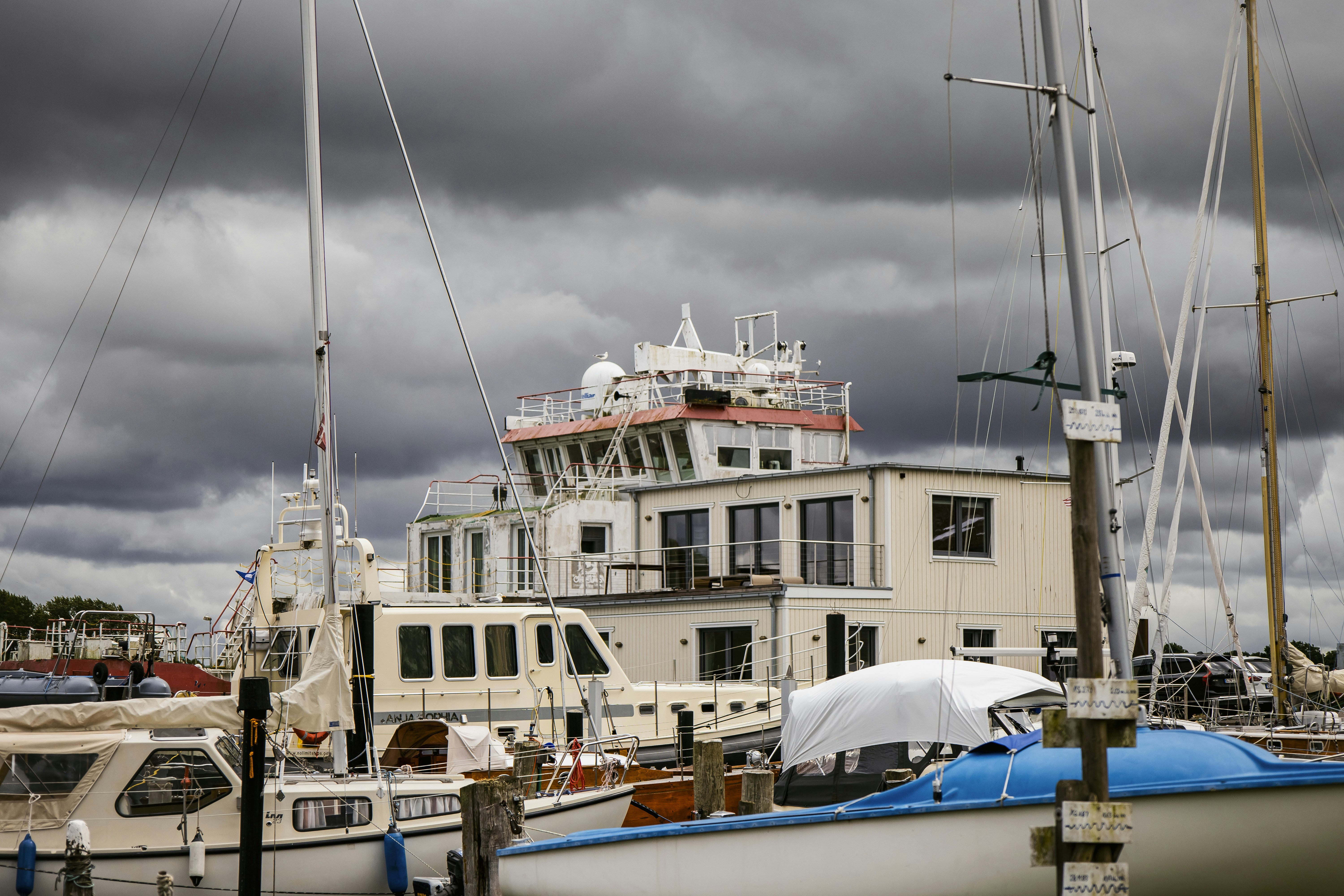 Docked Vessels Under a Turbulent Sky