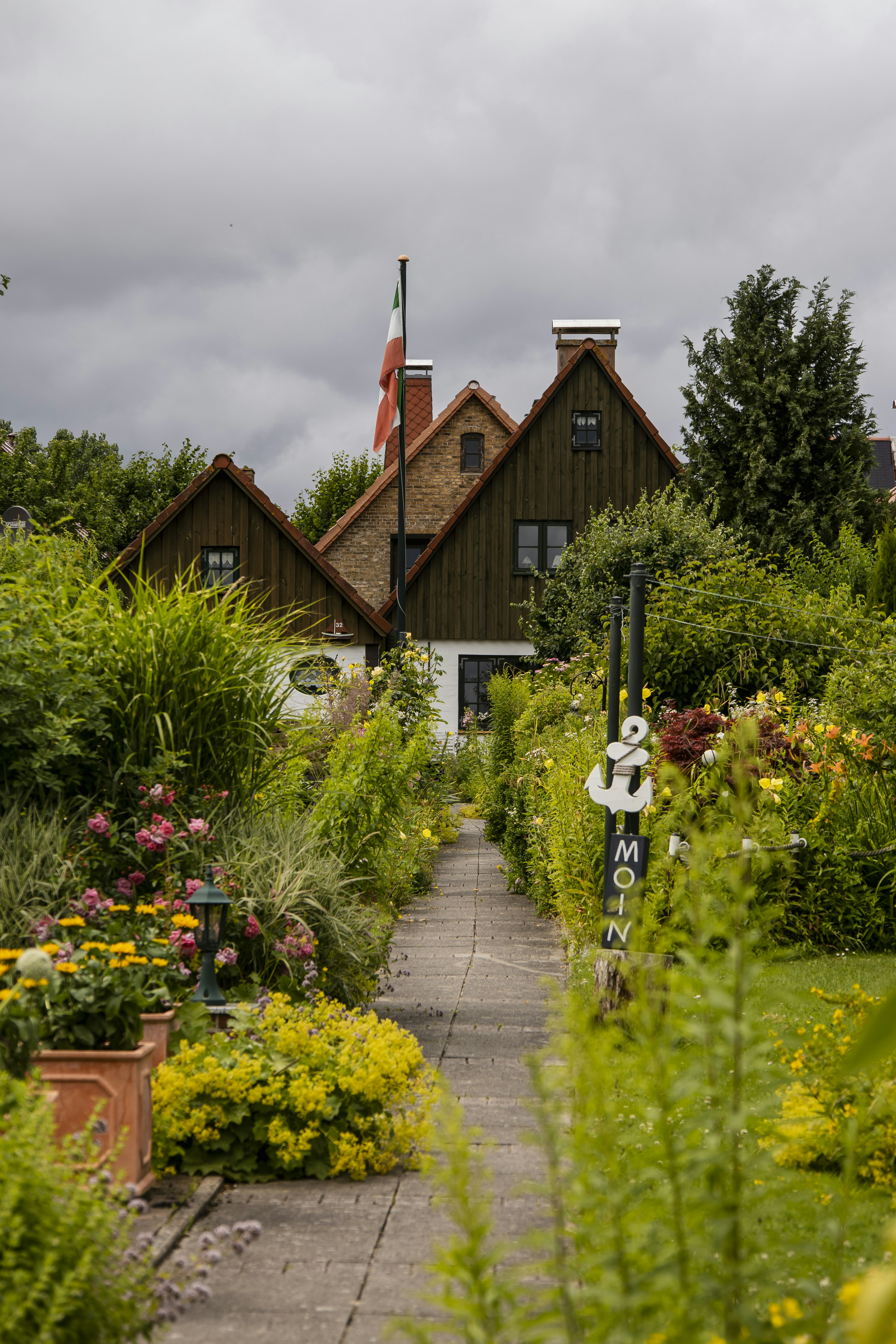 Flag Above a Cottage Garden Path