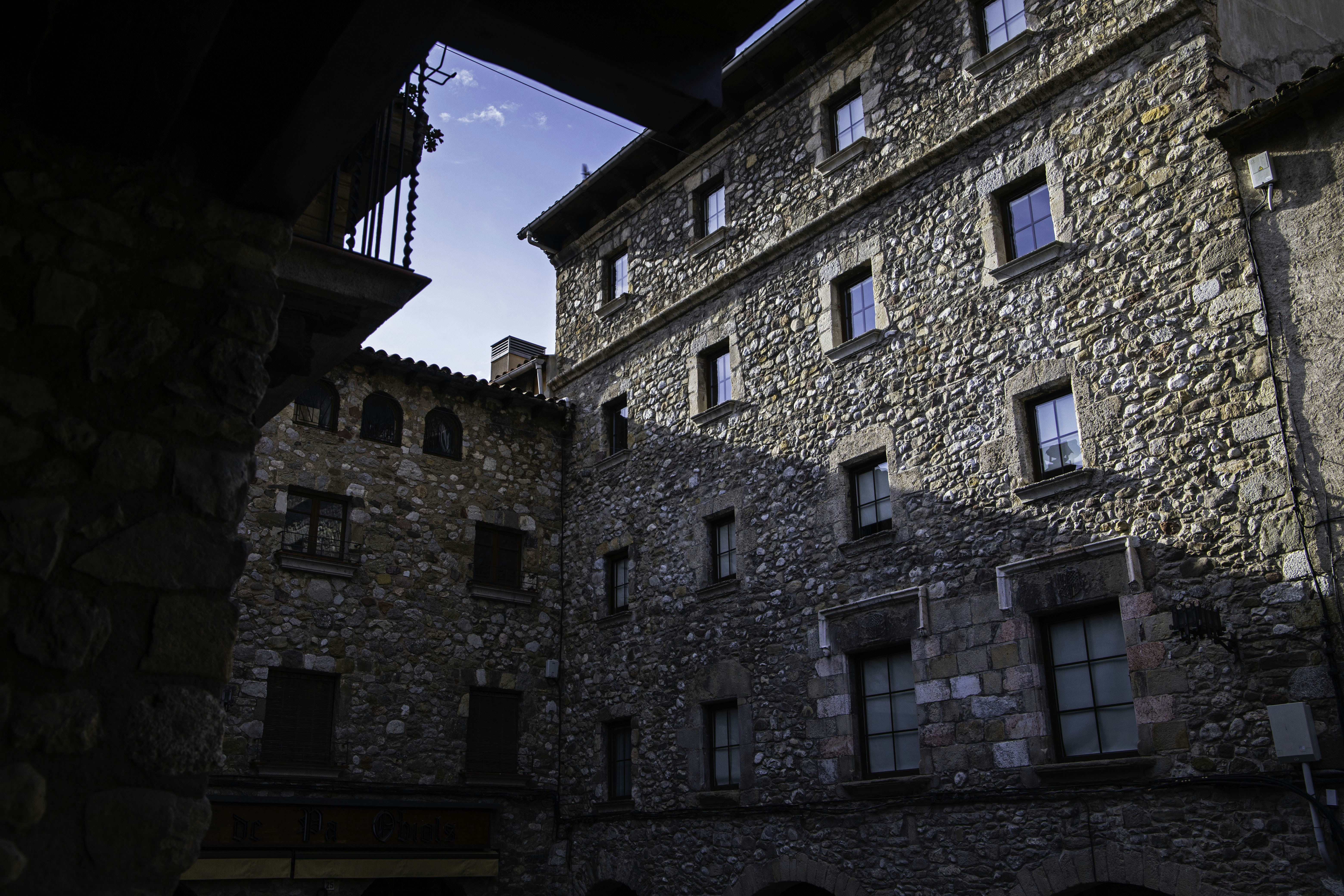 Sunlit Courtyard of Weathered Stone
