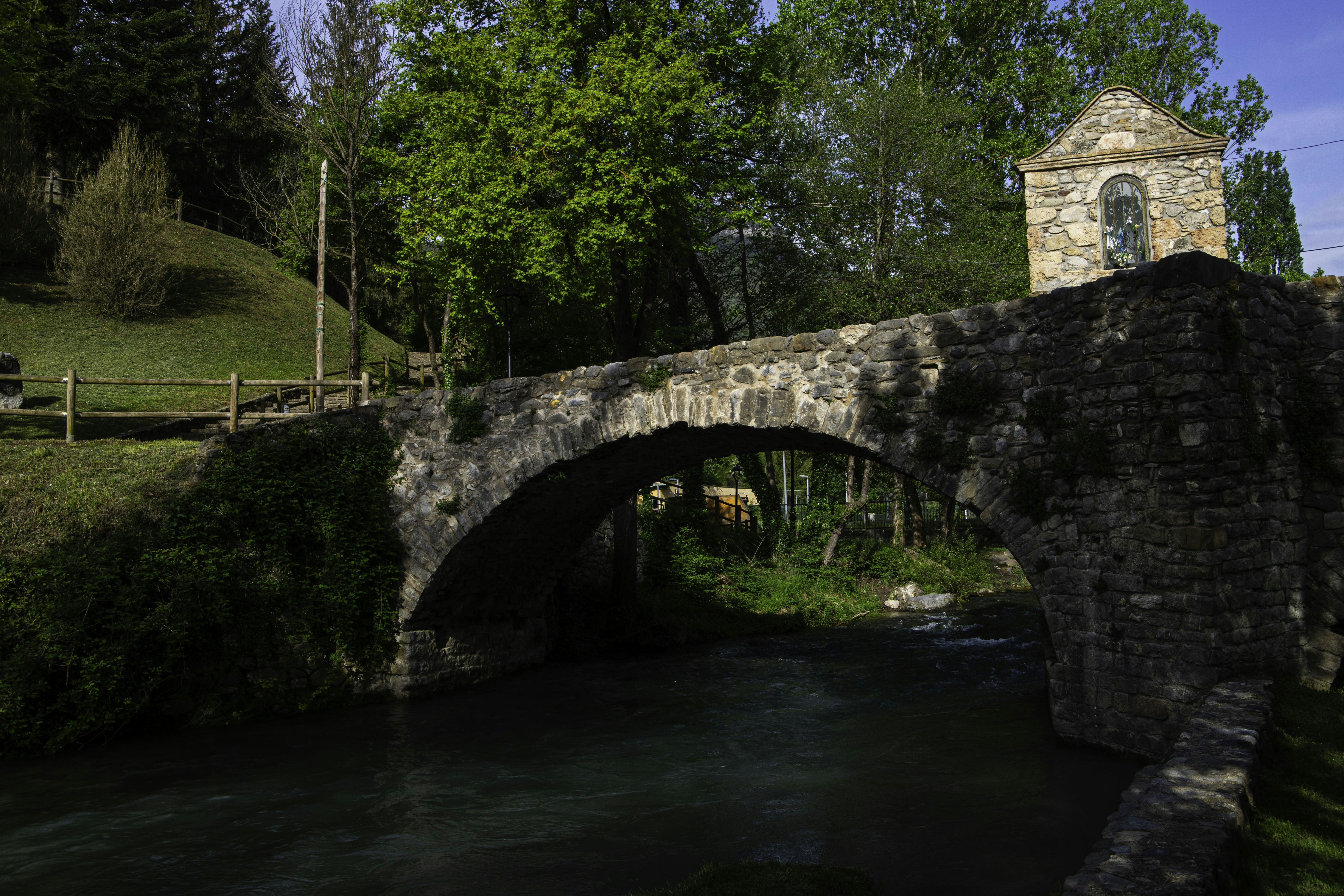 Ancient Stone Arch Over Quiet Waters