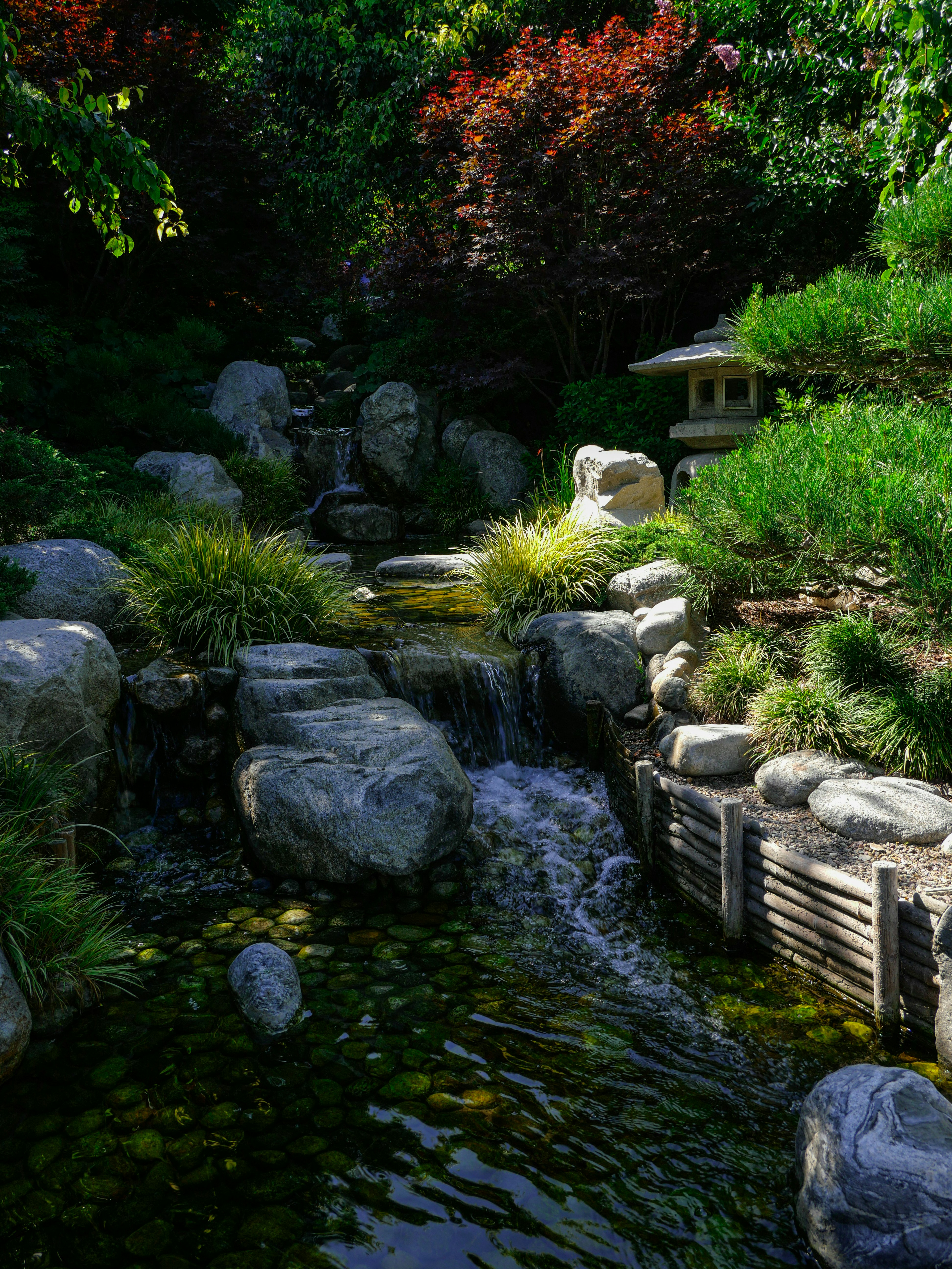 Serene Stream Garden with Stone Lantern and Waterfall