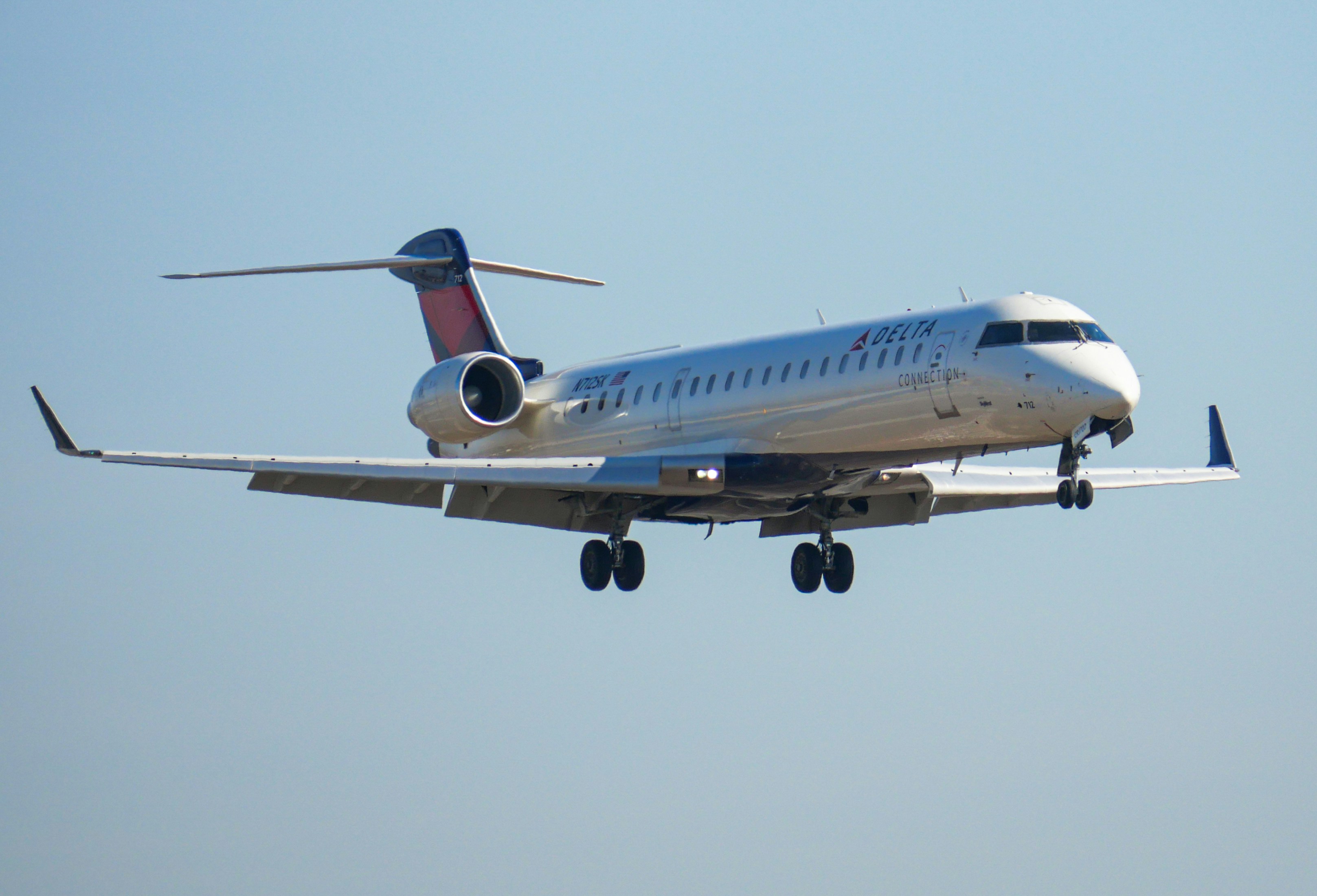 Approaching Run: Mid-Flight View of a Twin-Engine Regional Jet
