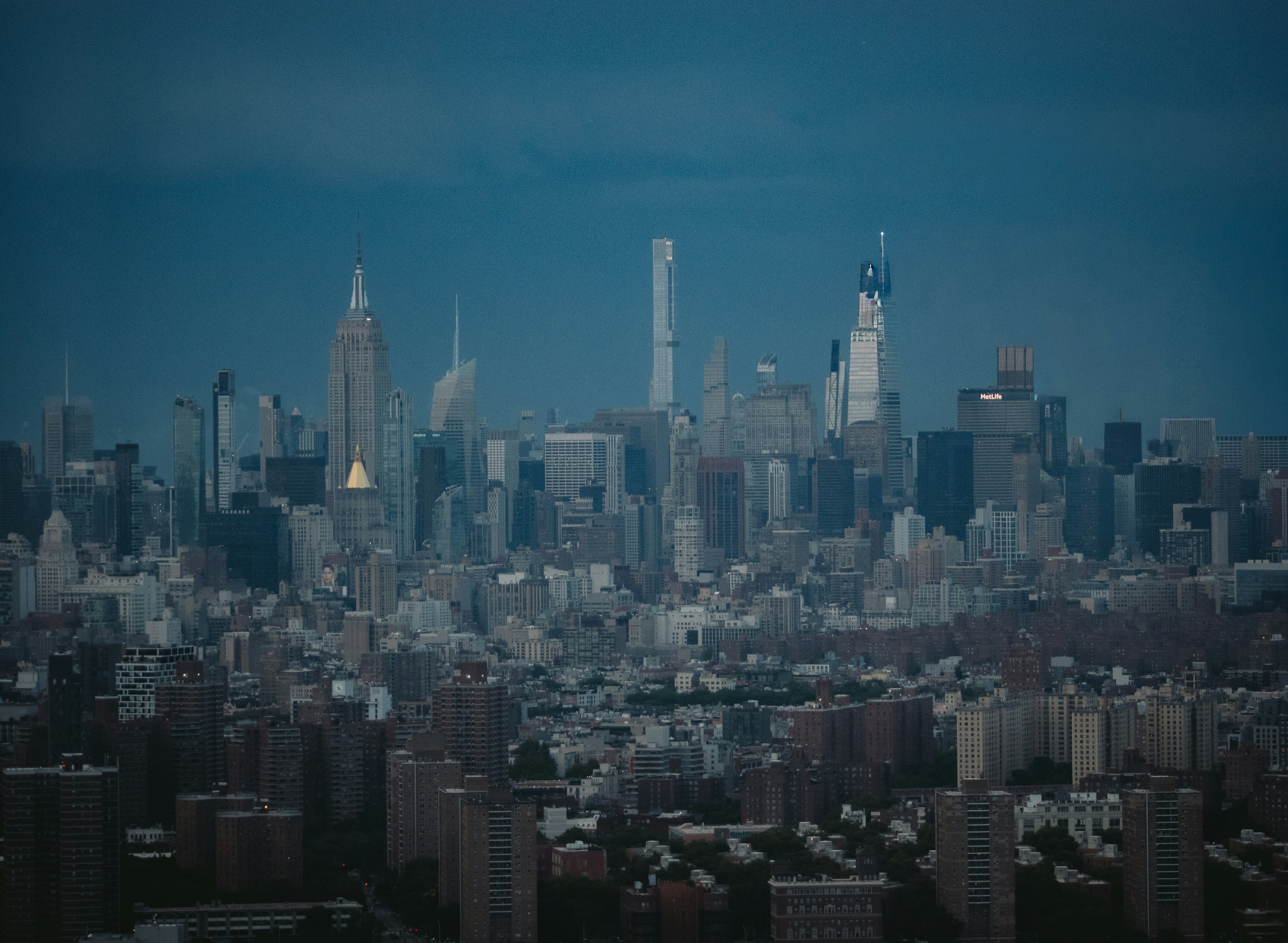 Midtown Silhouette: A Quiet Morning Over Manhattan's Veil of Blue