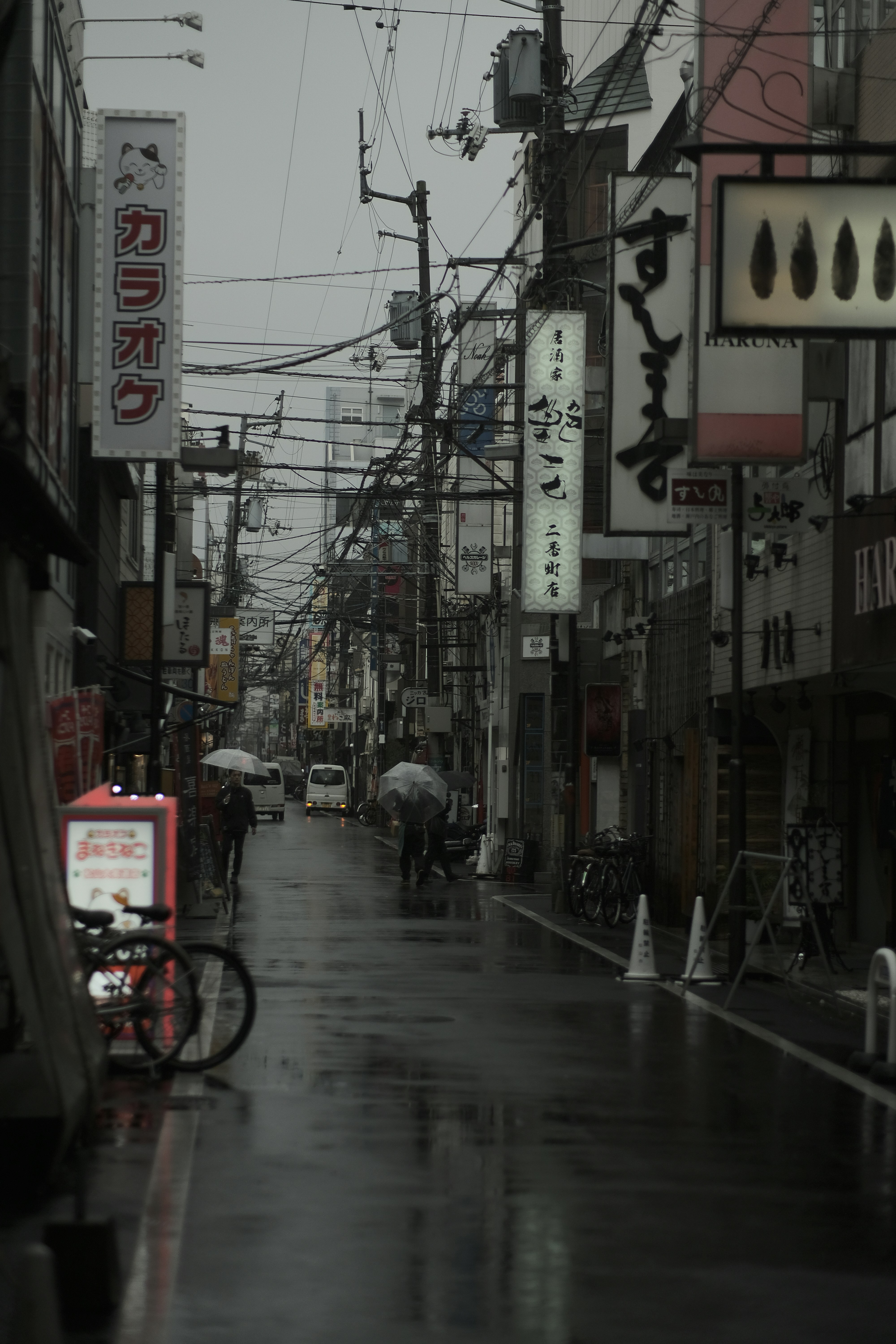 Rainy Neon Alley: A Breath of Quiet in a City Street