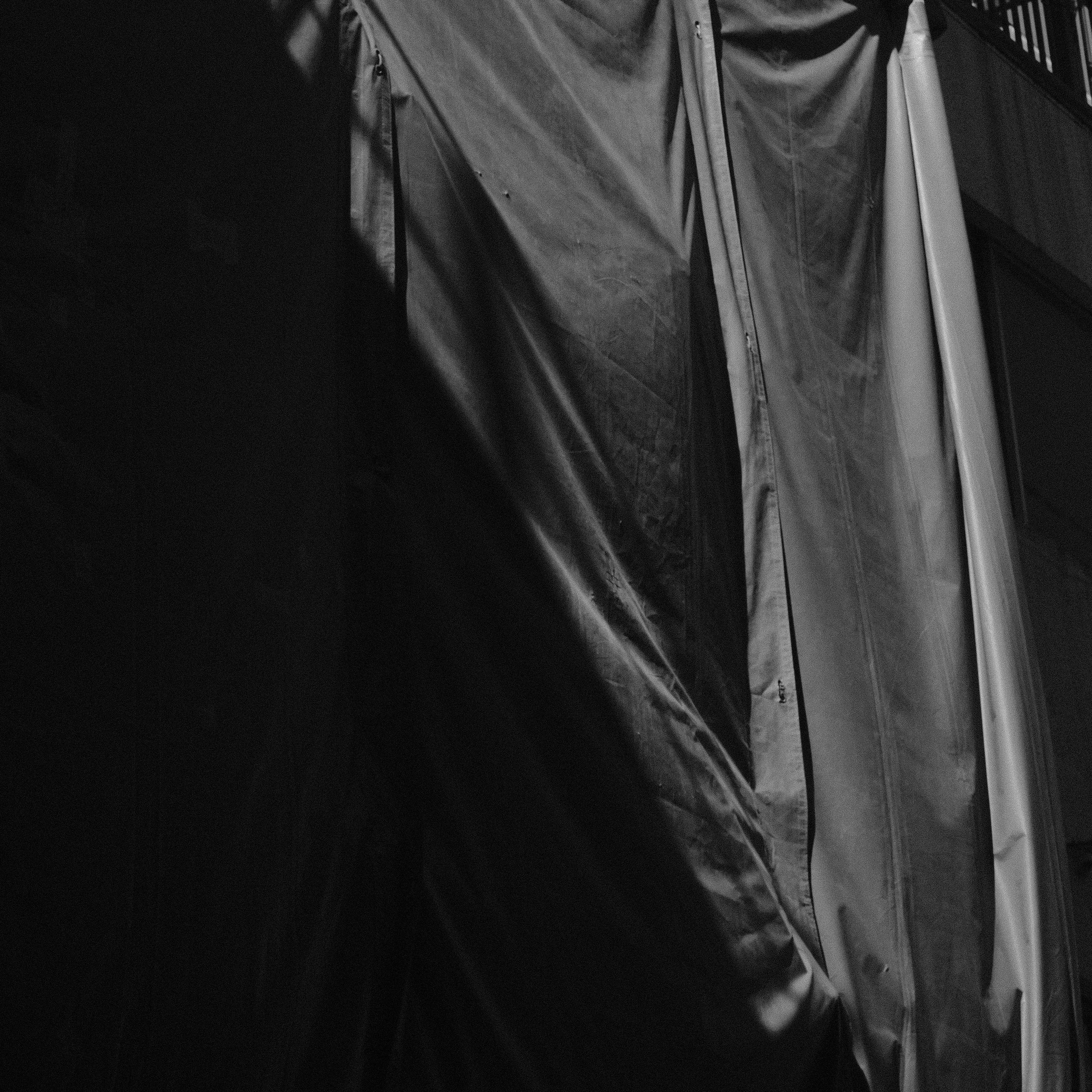 Moonlit Drapes: Narrow Alley Sheen in Monochrome Fabric