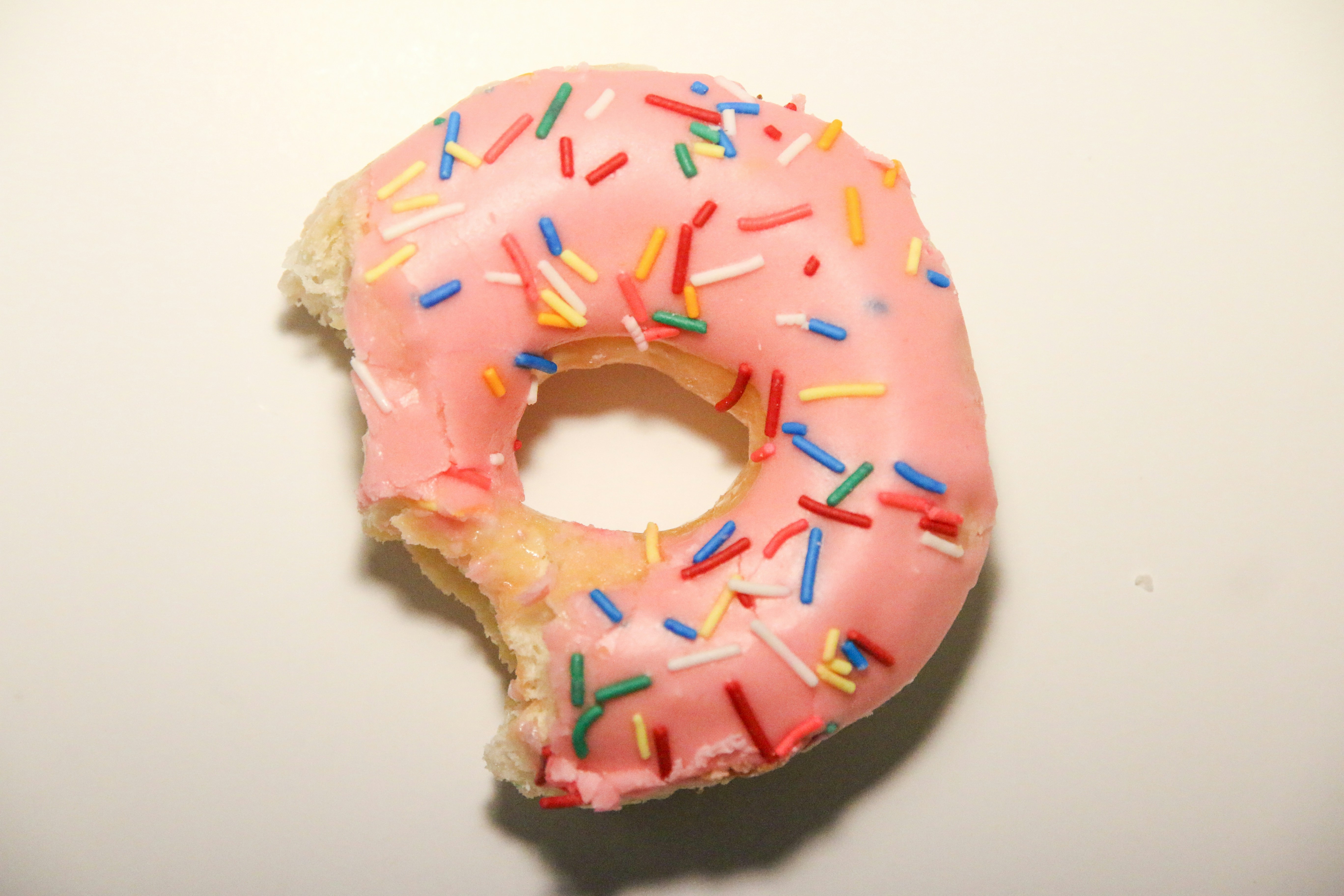 Pink Sprinkled Donut: a bite-sized moment of sweetness