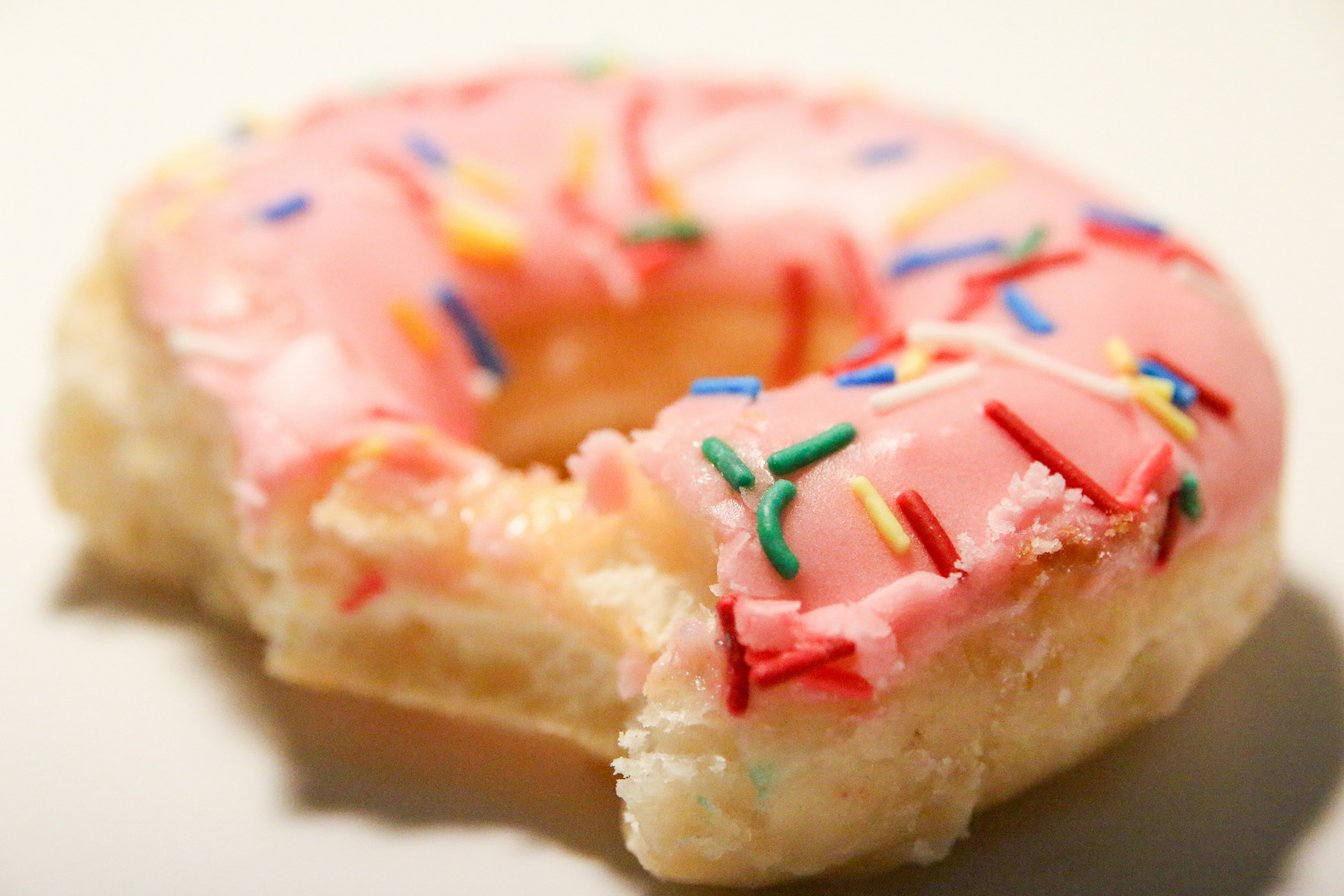 Pink-Glazed Donut Bite with Sprinkles