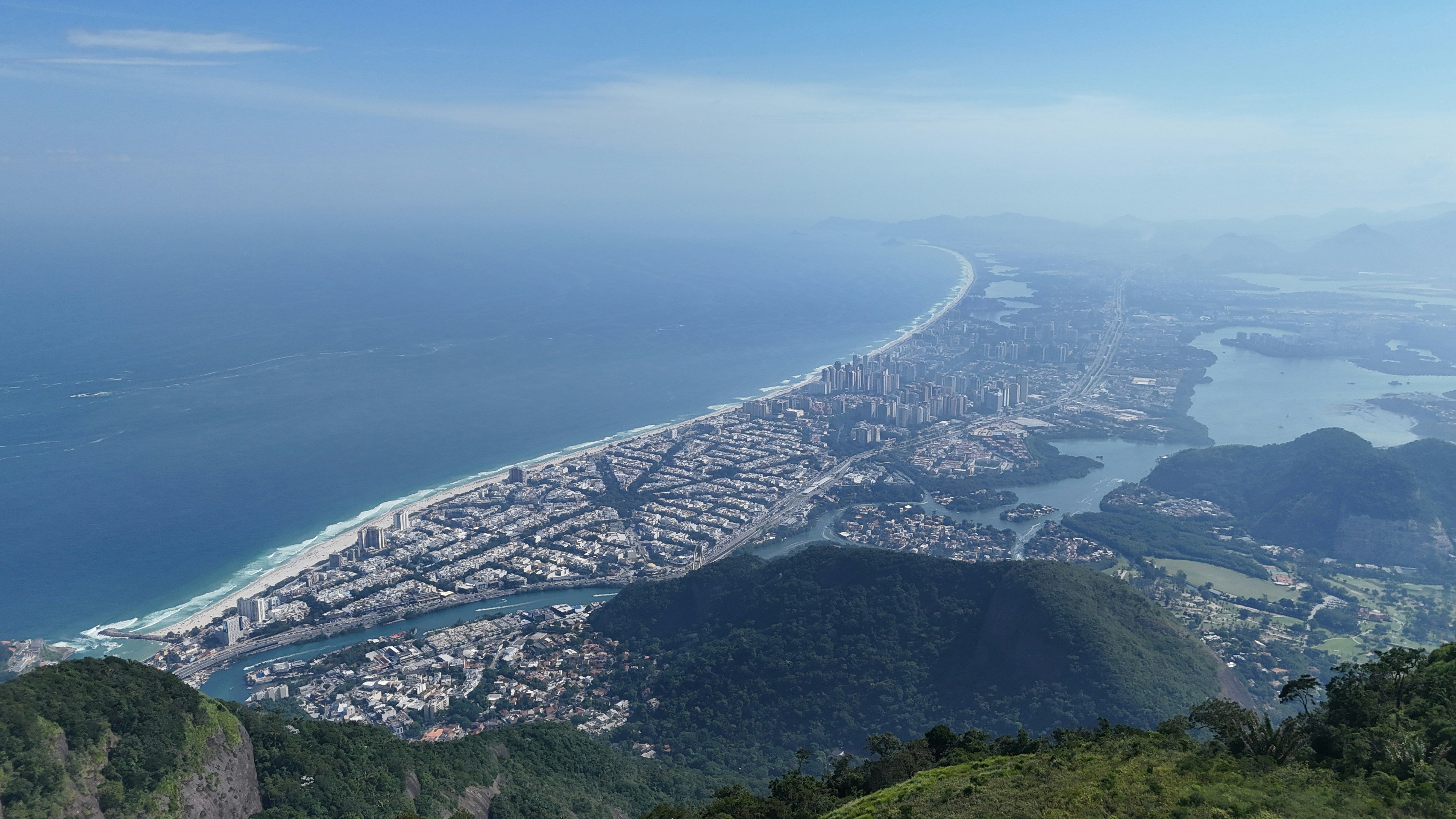 Coastal City Strung Along the Sea: Aerial View from the Green Hills