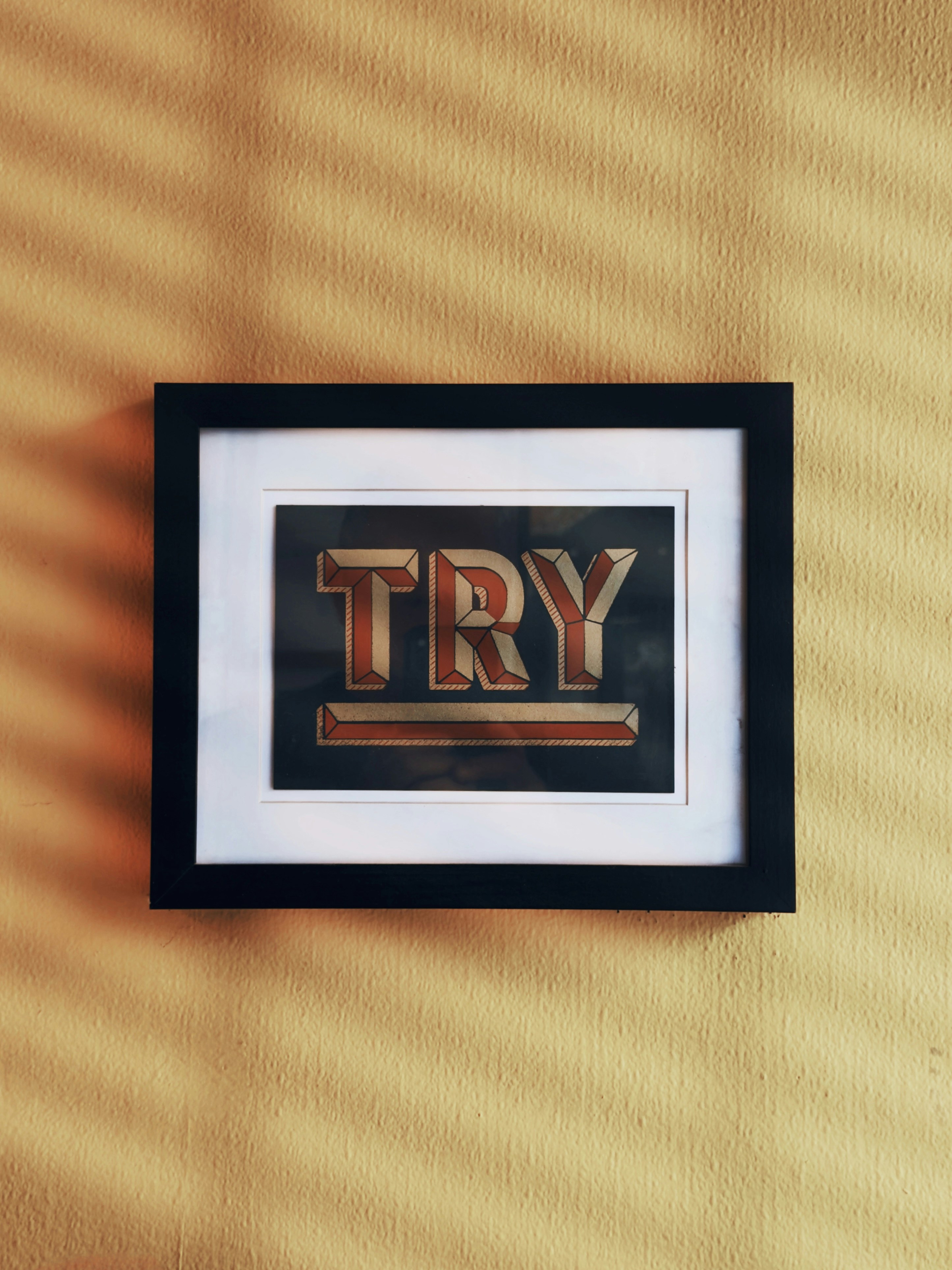 Framed Try: A Bold Word in a Minimal Gallery