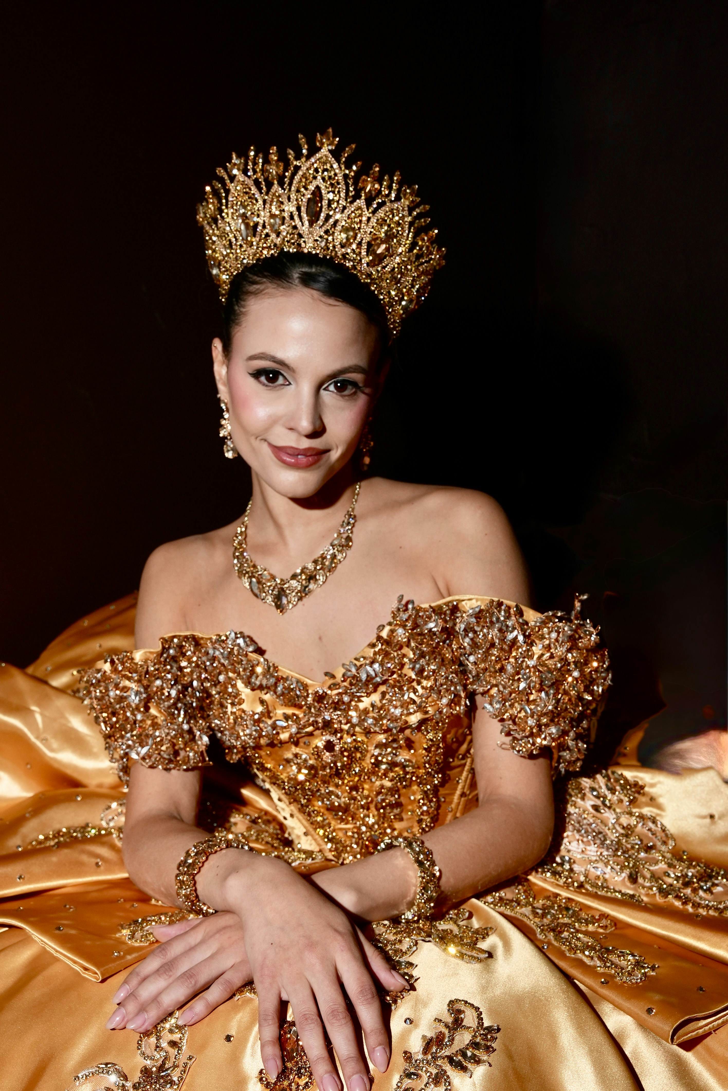 Golden Regal Dame: Crown, Gown, and Grace