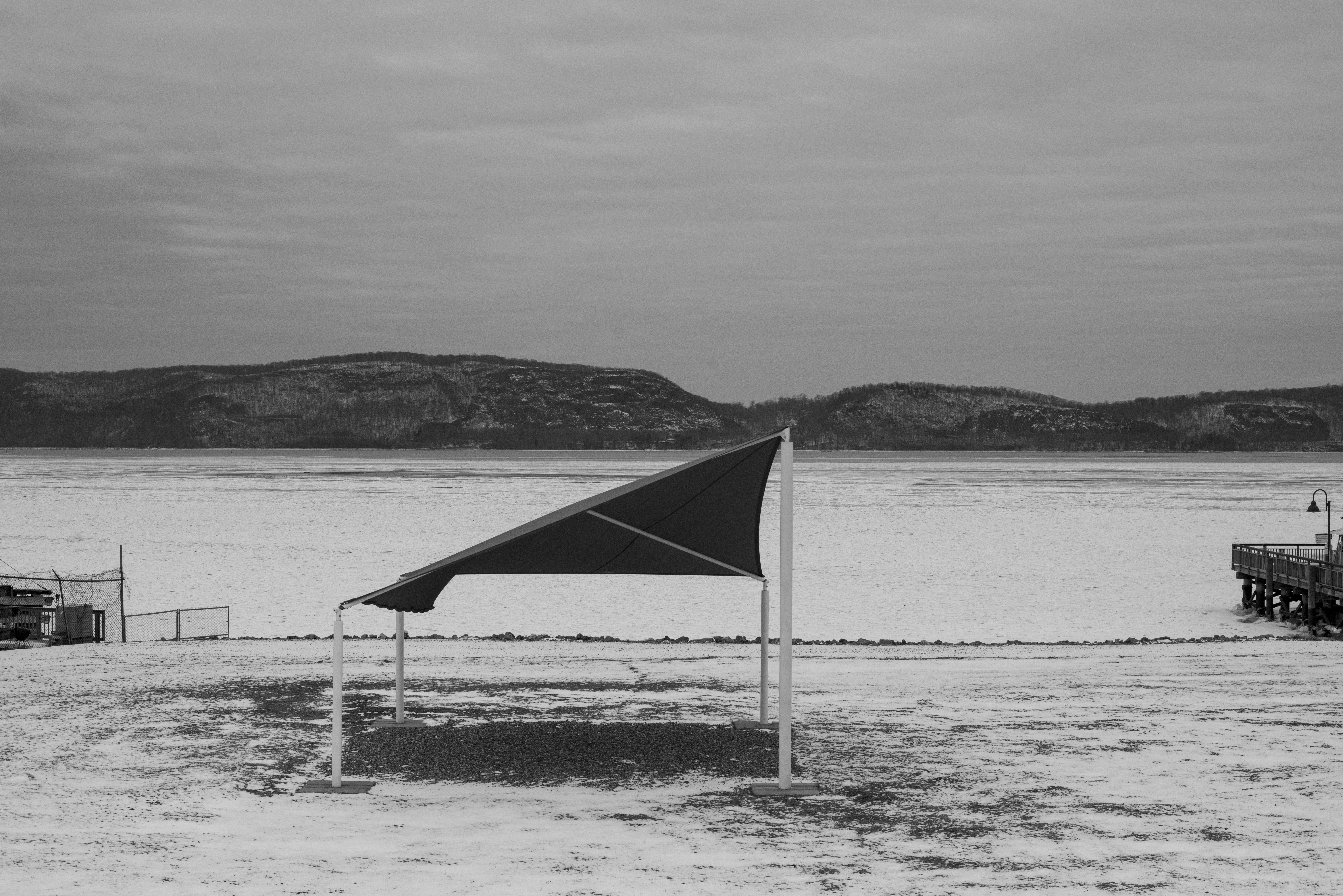 Wing Shelter Over Snowy Lake