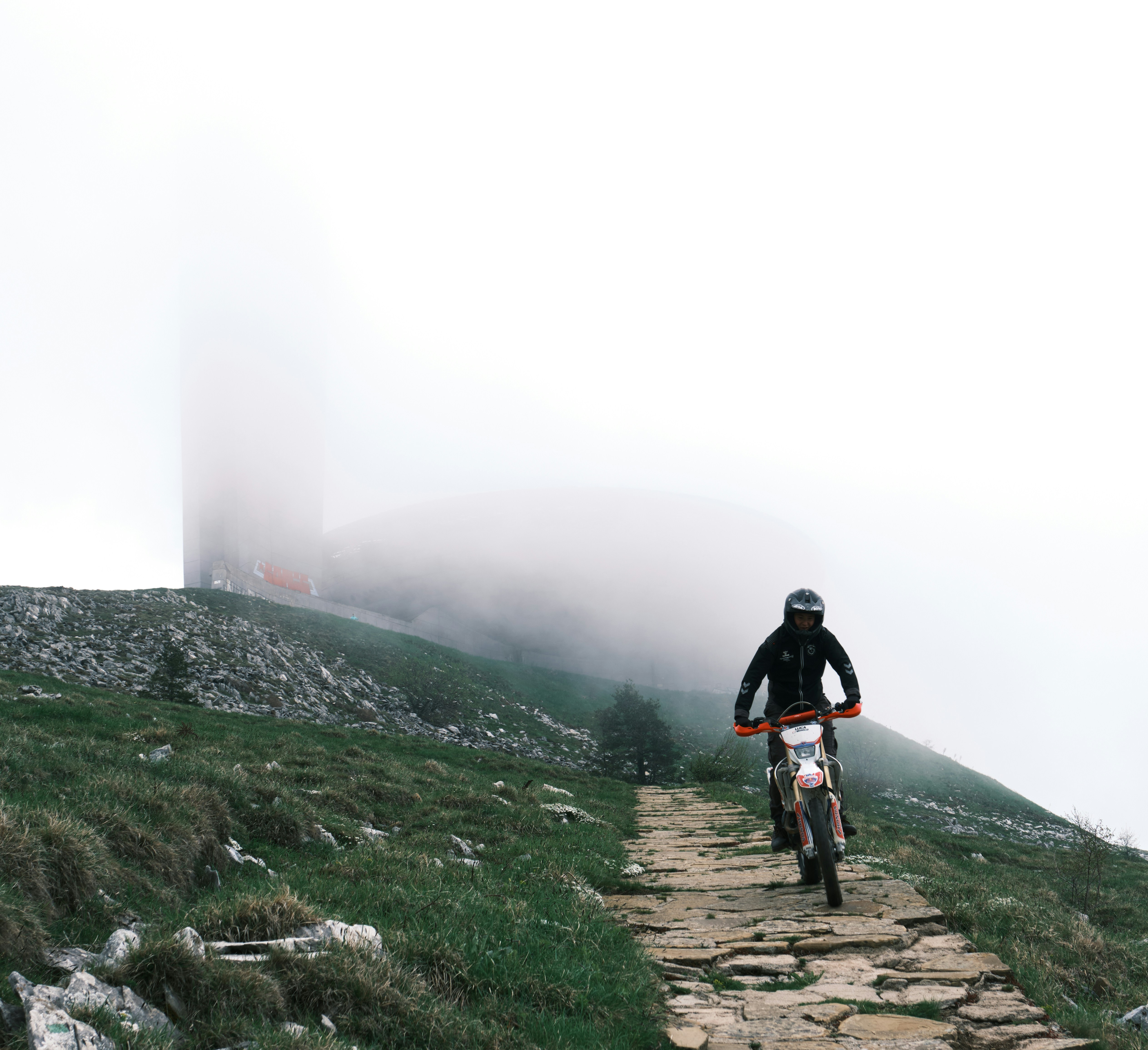 Mist on Ridge: Motocycle Trek Through Clouded Summit