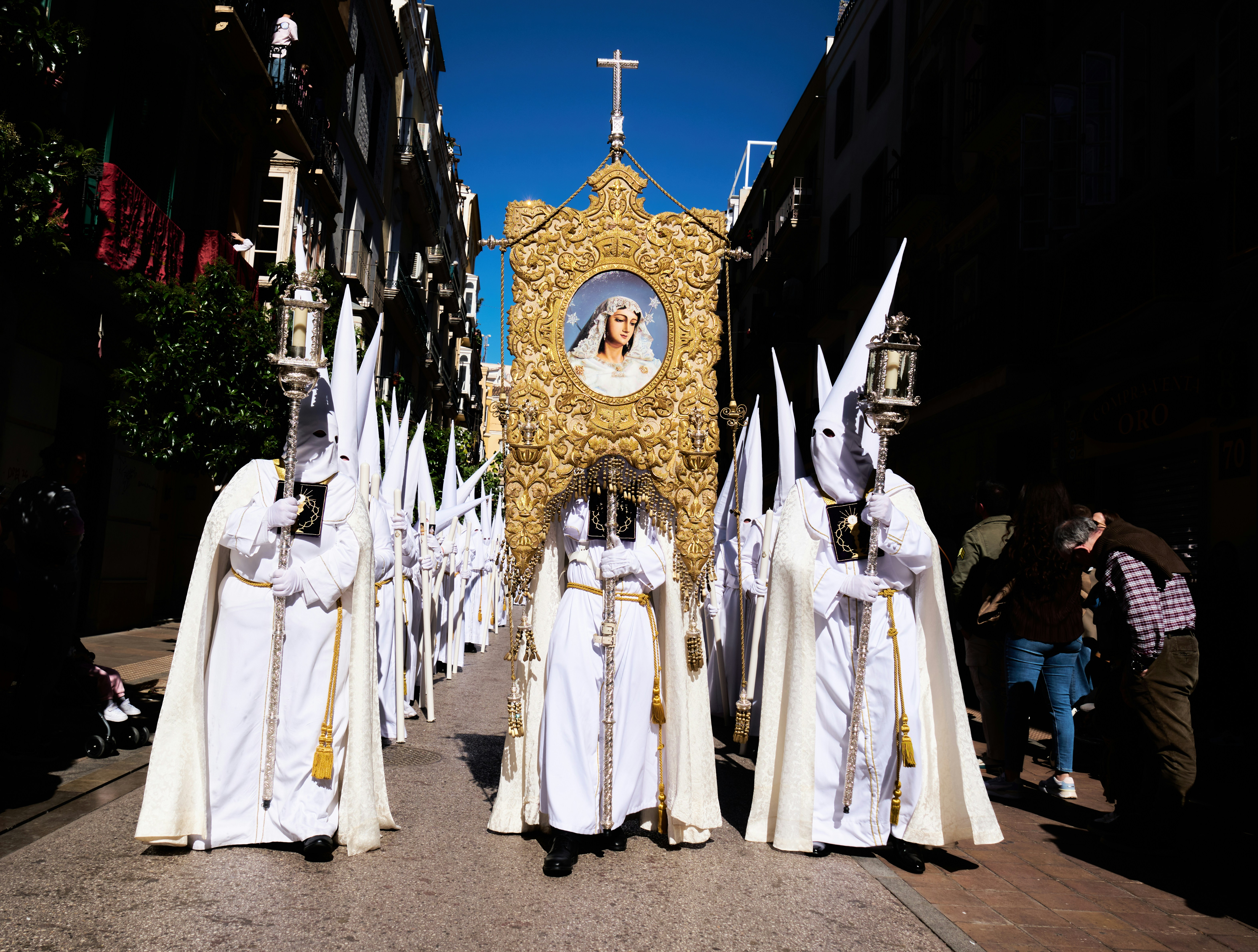 Procession of the Sacred Icon: White-robed Pilgrims Marching Under a gilded Monstrance