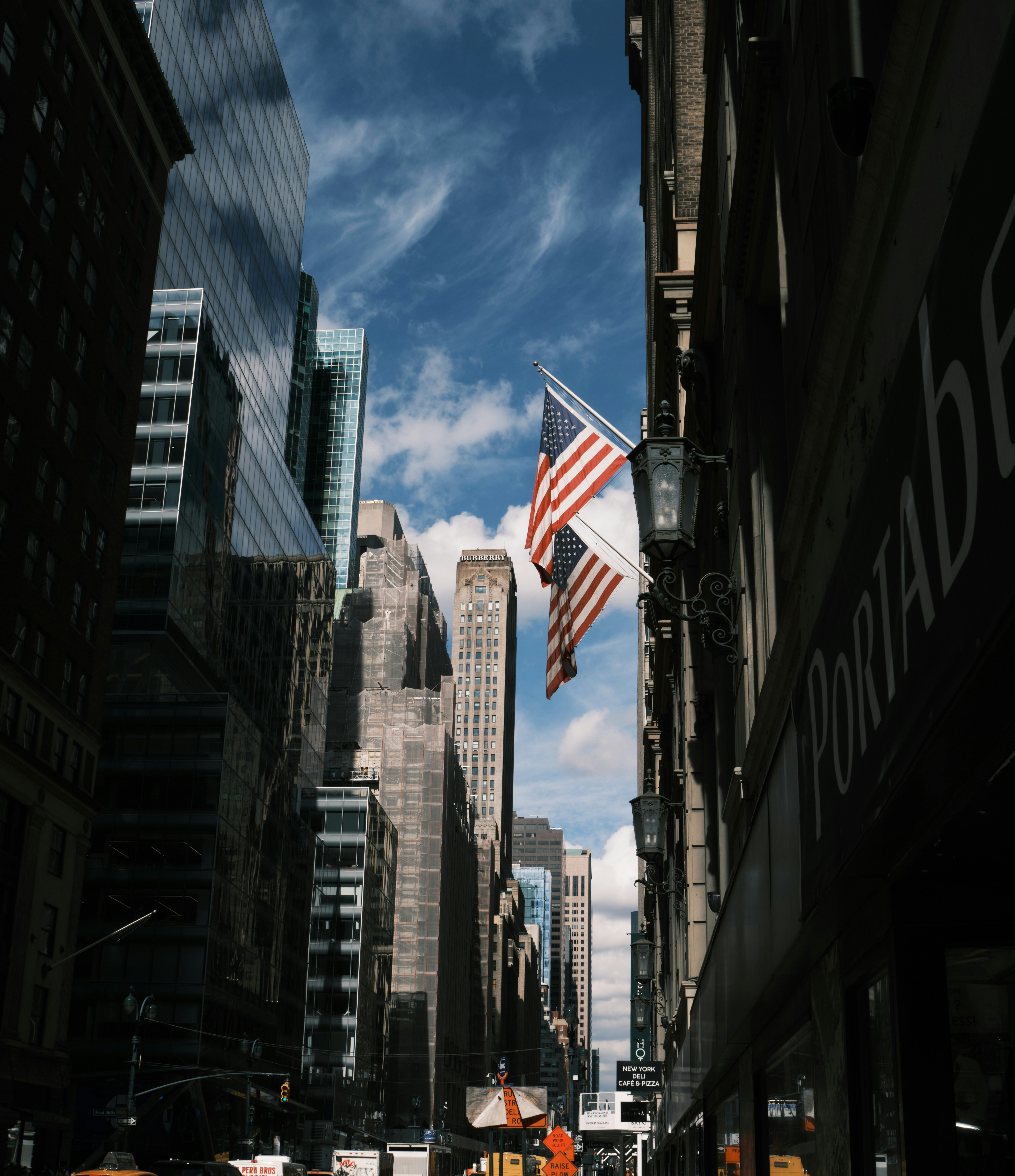 Flags Above a Canyon of Skyscrapers