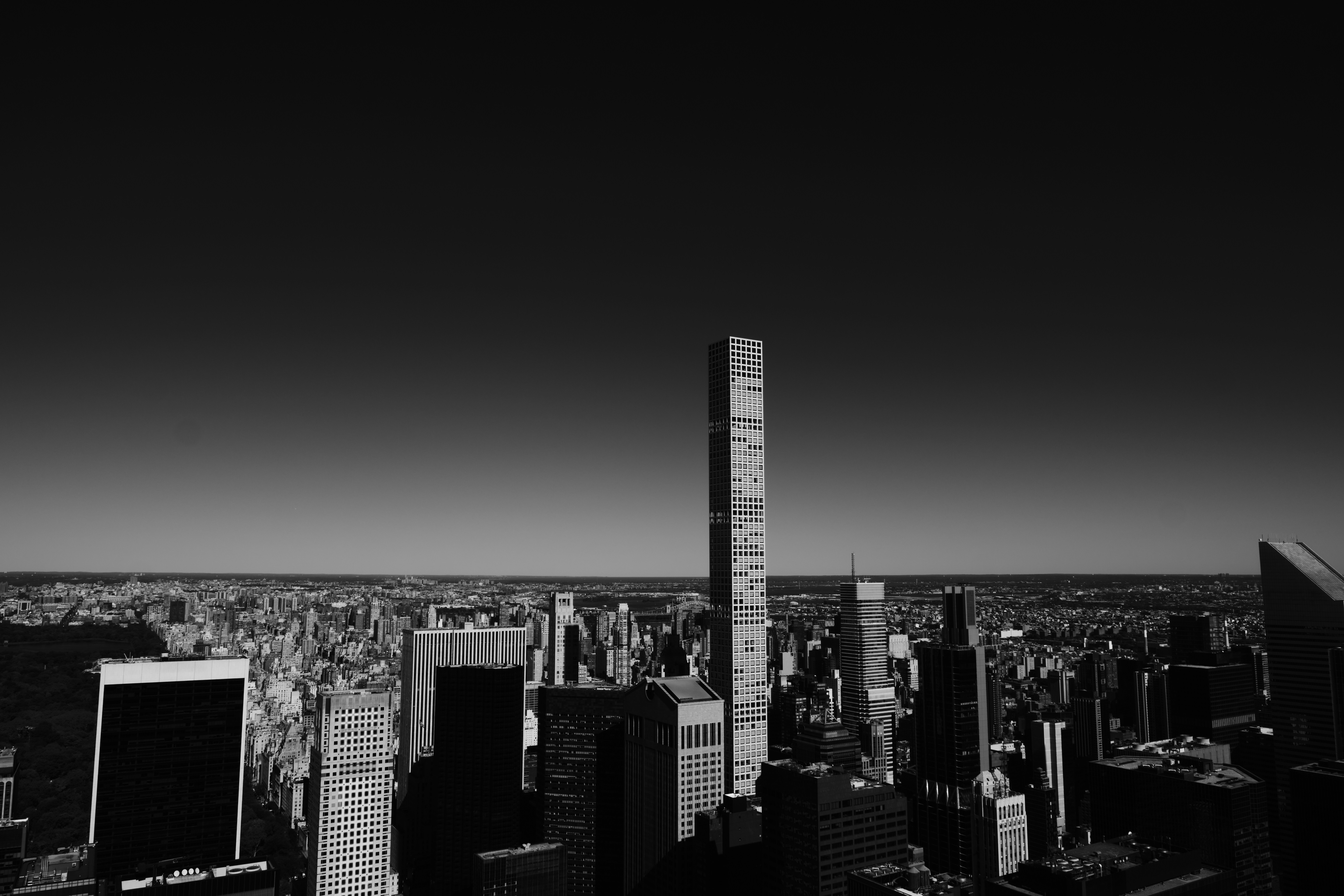 Skyline Silhouette: A Tower Reaches Toward the Gradient