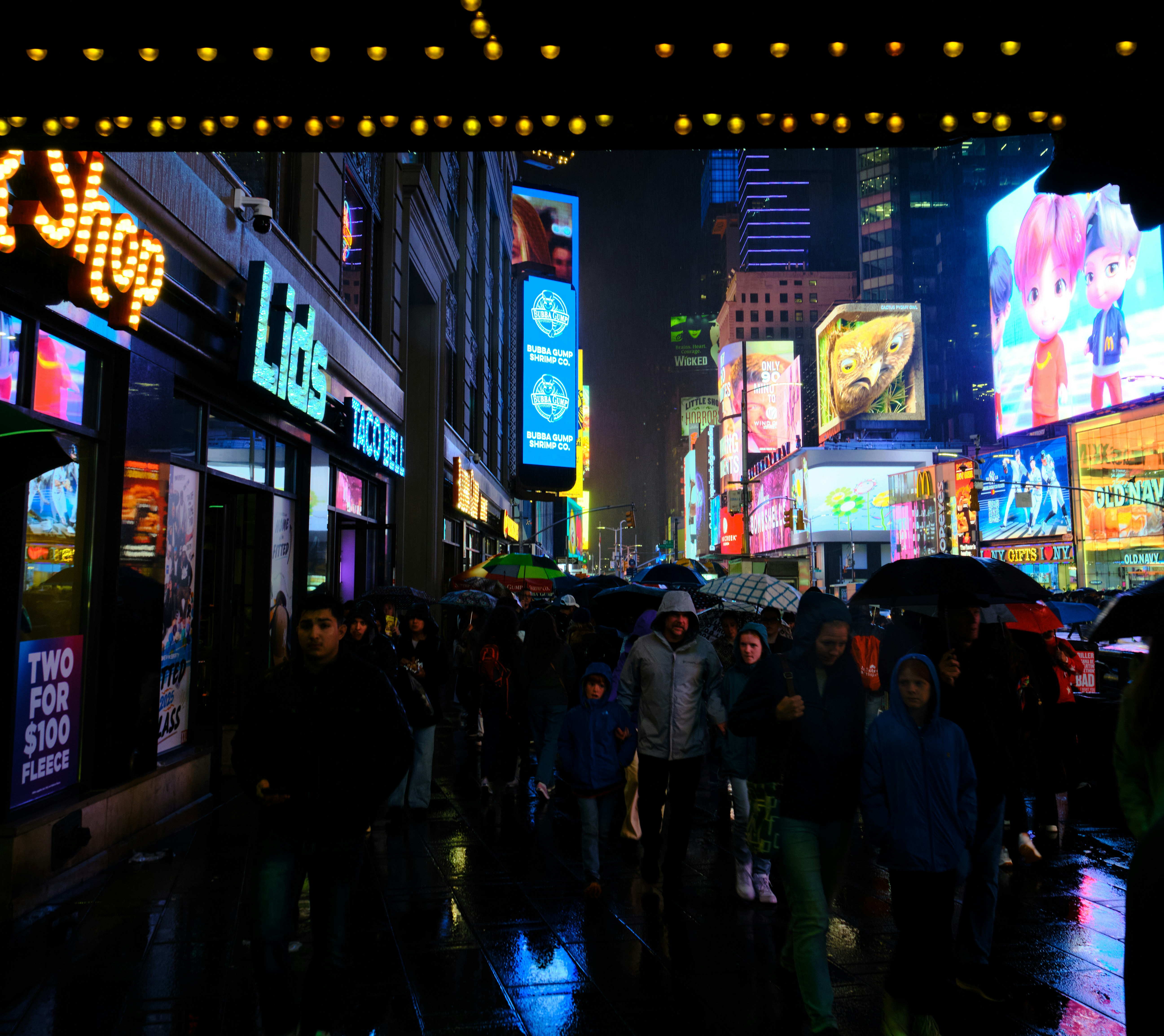 Neon Crossroads: Crowds and Lights in a Rain-Slick City Night