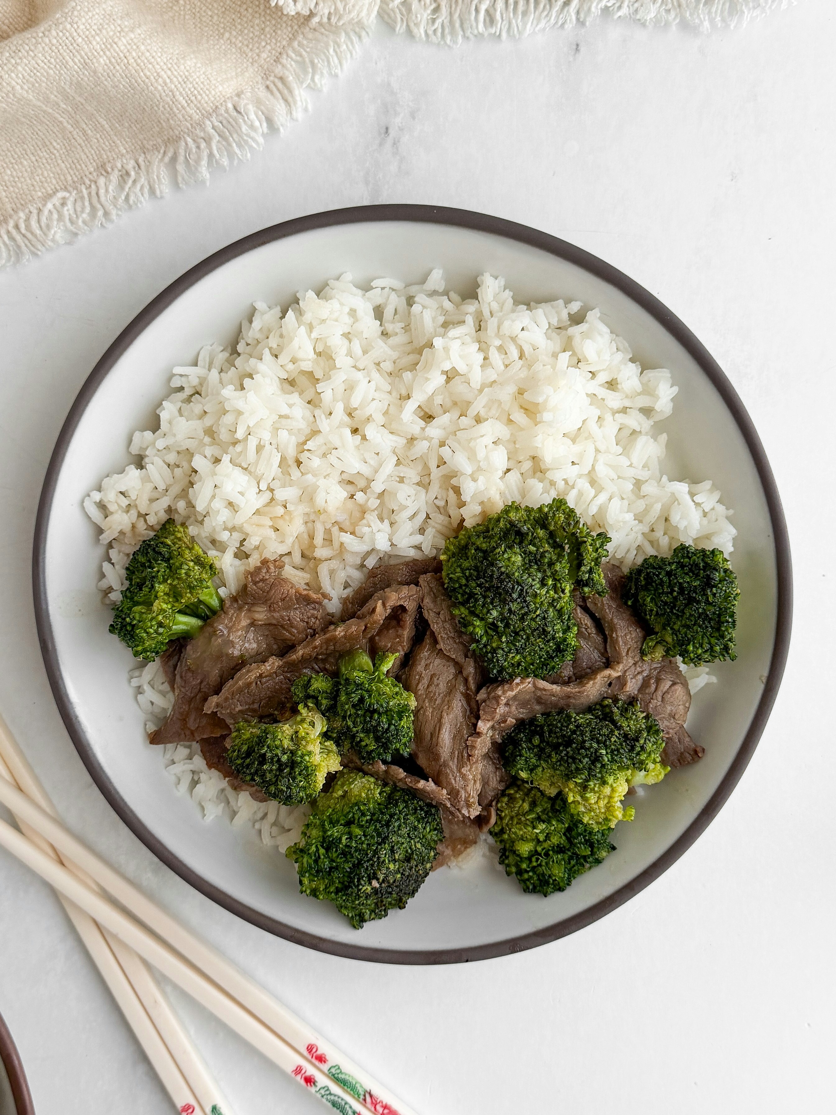 Beef and Broccoli over Fluffy Rice in a Minimalist Bowl