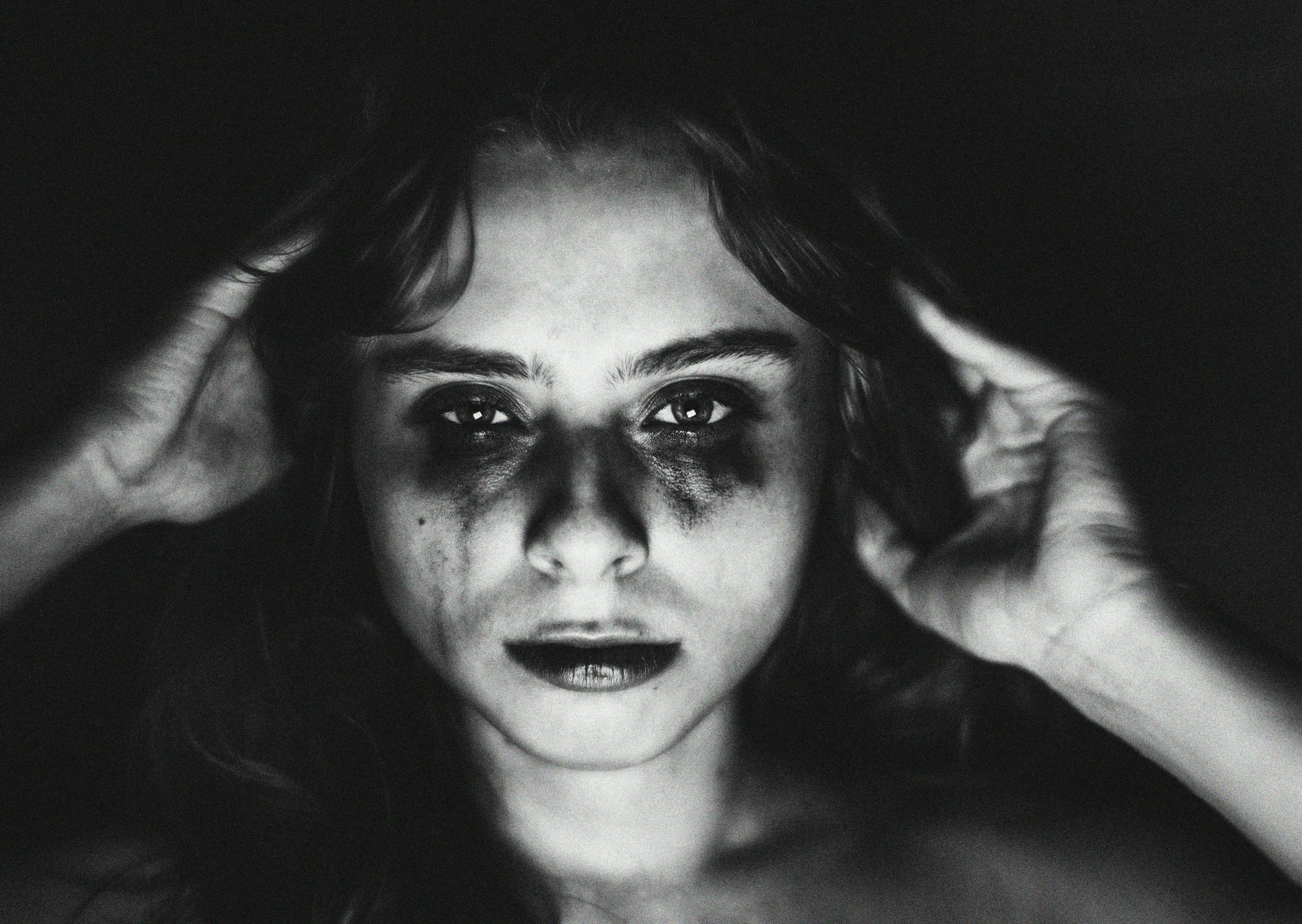 Dark Portrait: A Quiet Gaze Beneath Gentle Shadows