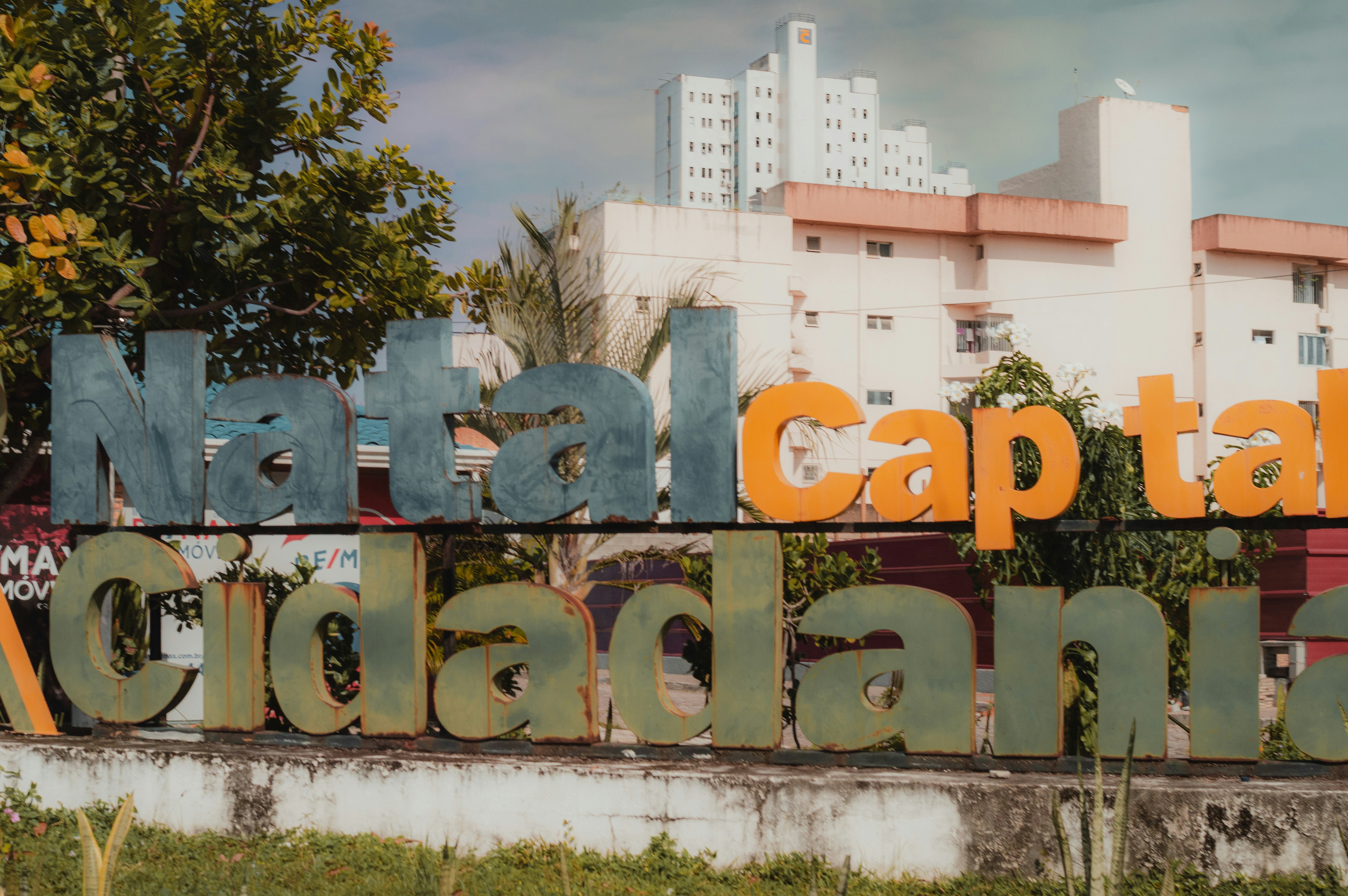 Multicolored Signage in a Sunlit Urban Park