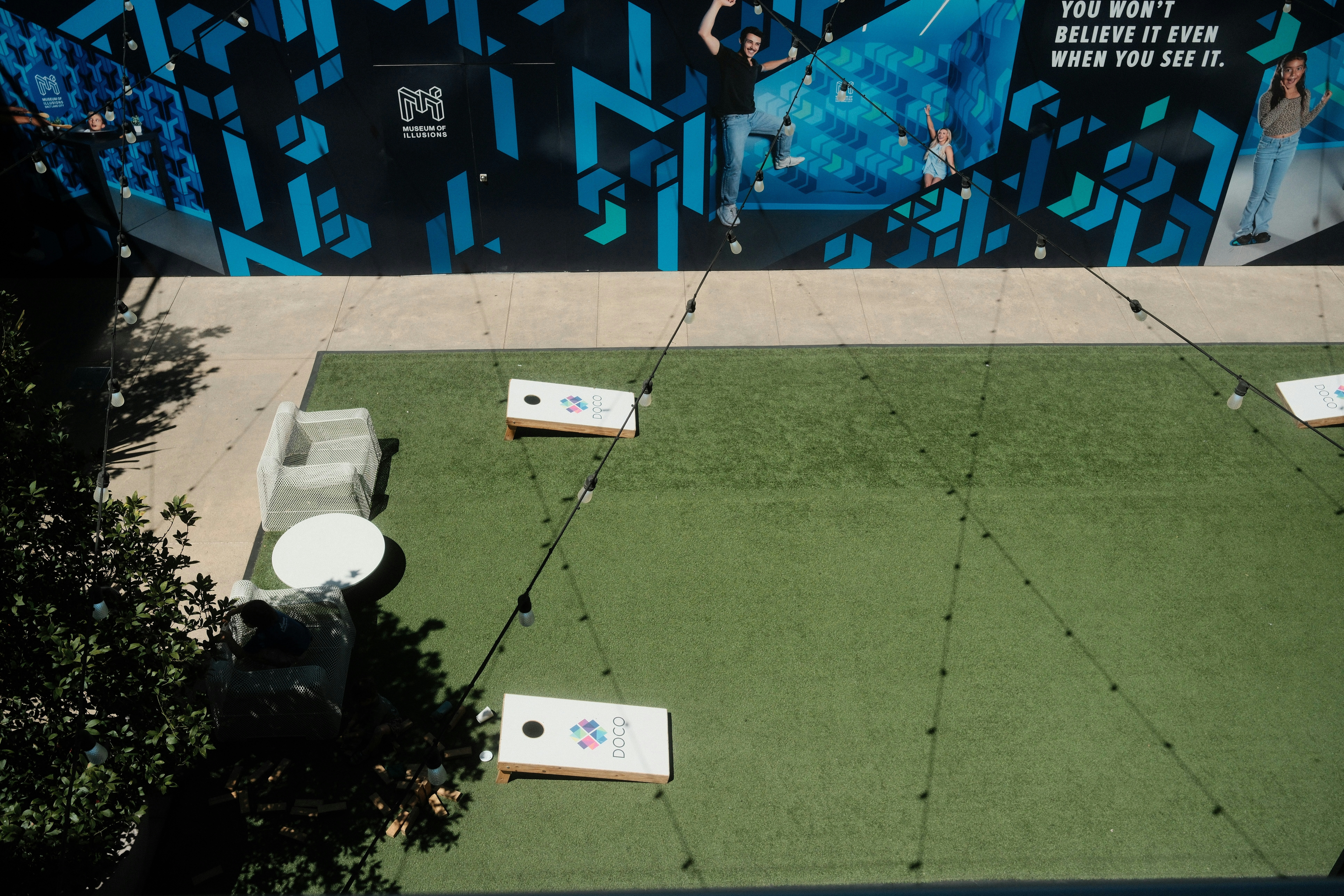 Aerial Court of Smart Lawn: Outdoor Setup Beneath a Gallery Wall