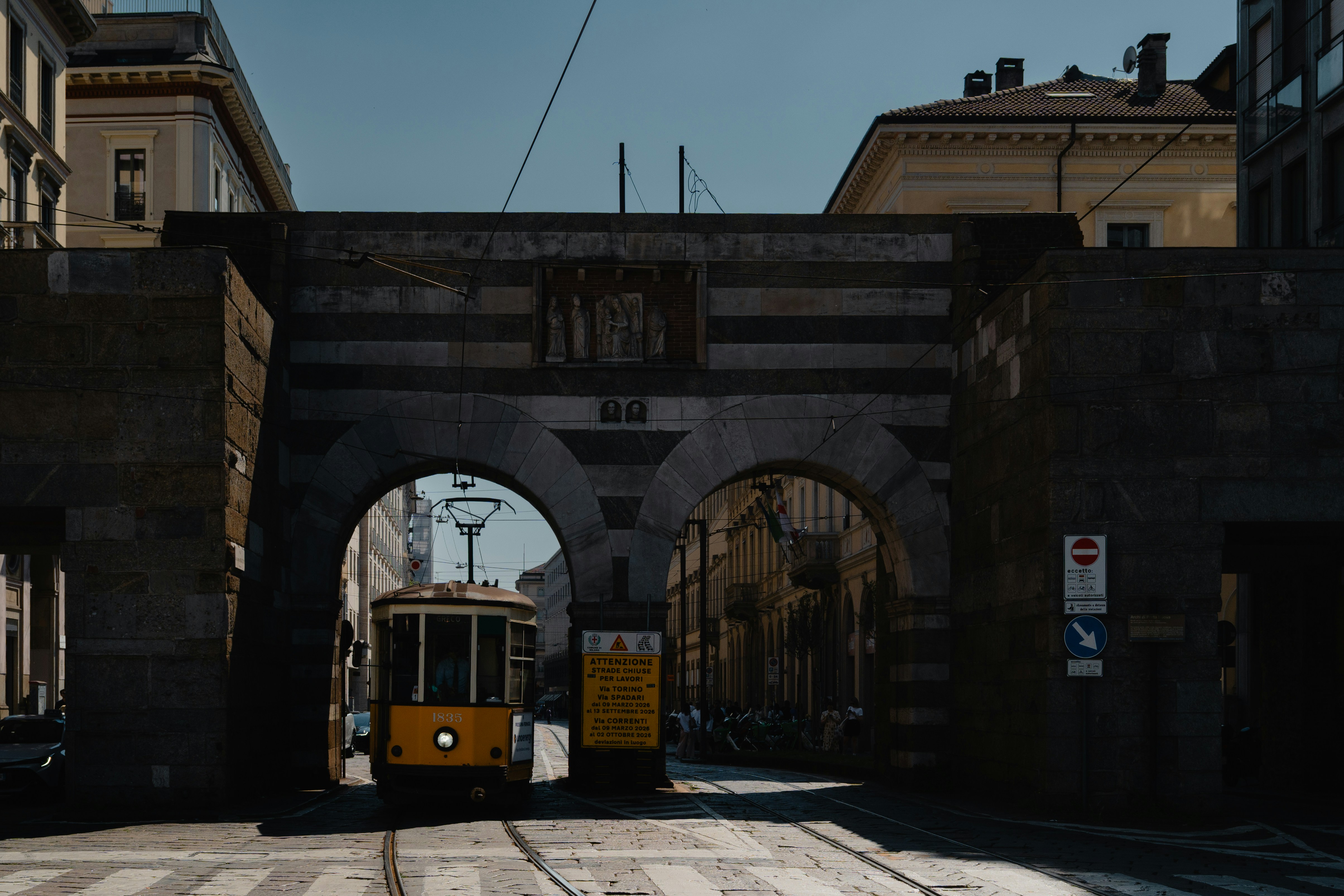 Yellow Tram at the Stone Arch: Gate to the City