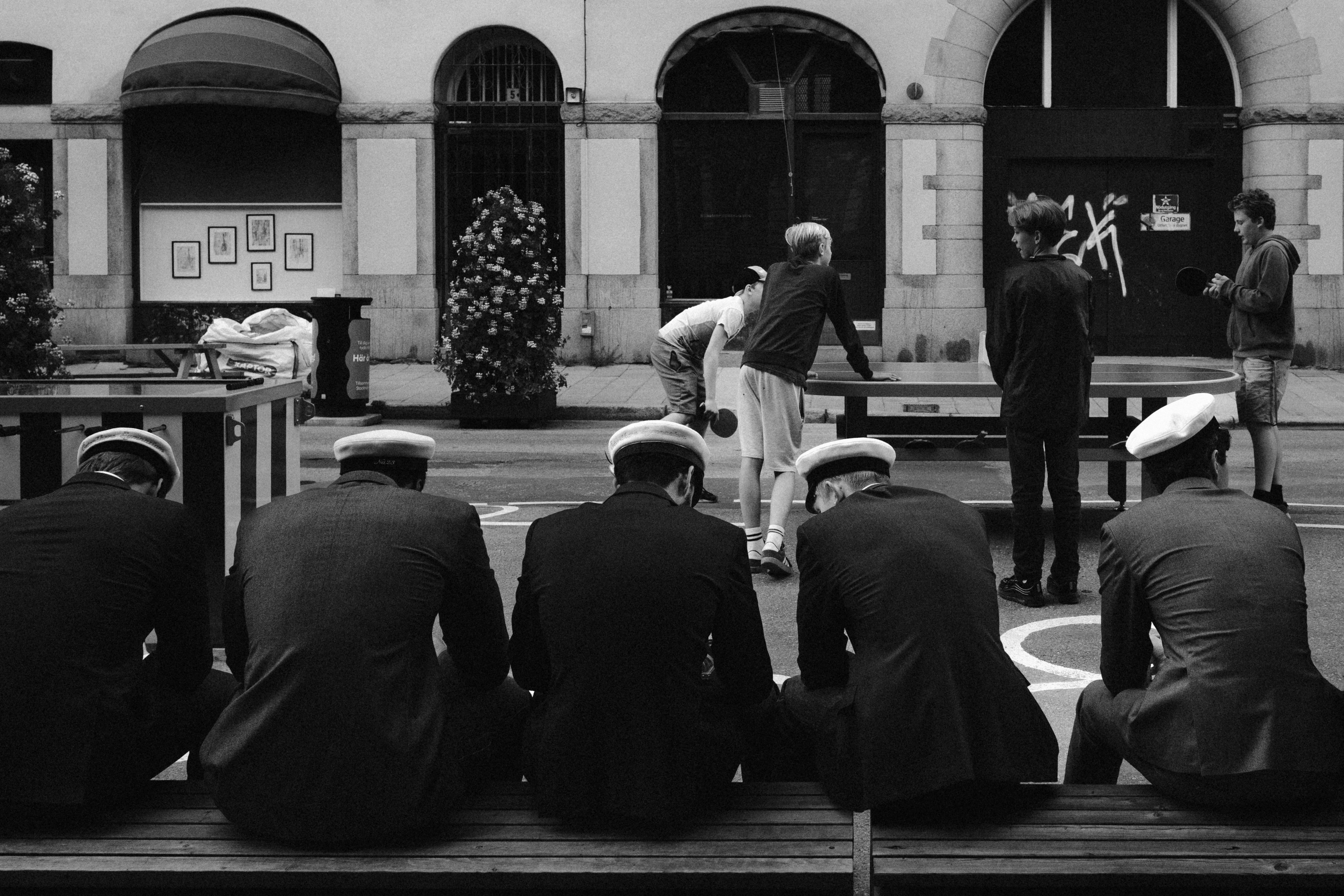Silhouettes and Serenade: Musicians Guard a Quiet Plaza